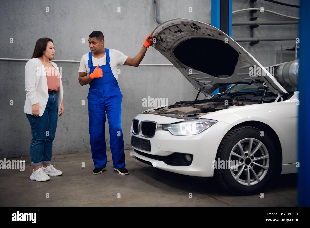 Car repair discussion hi-res stock photography and images - Alamy