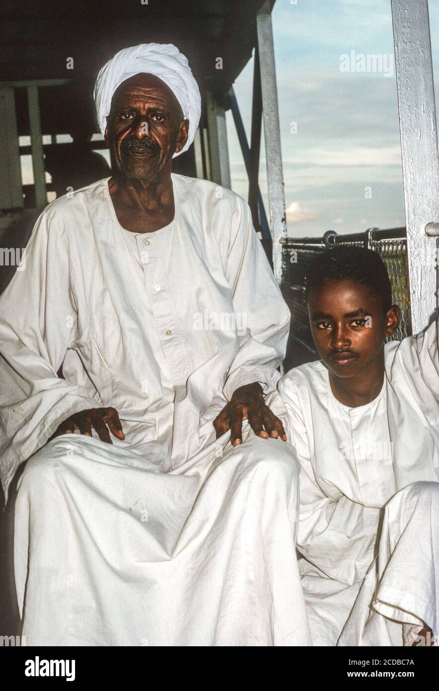 Sudanese Father and Son, Boat Passengers on the White Nile between Juba ...