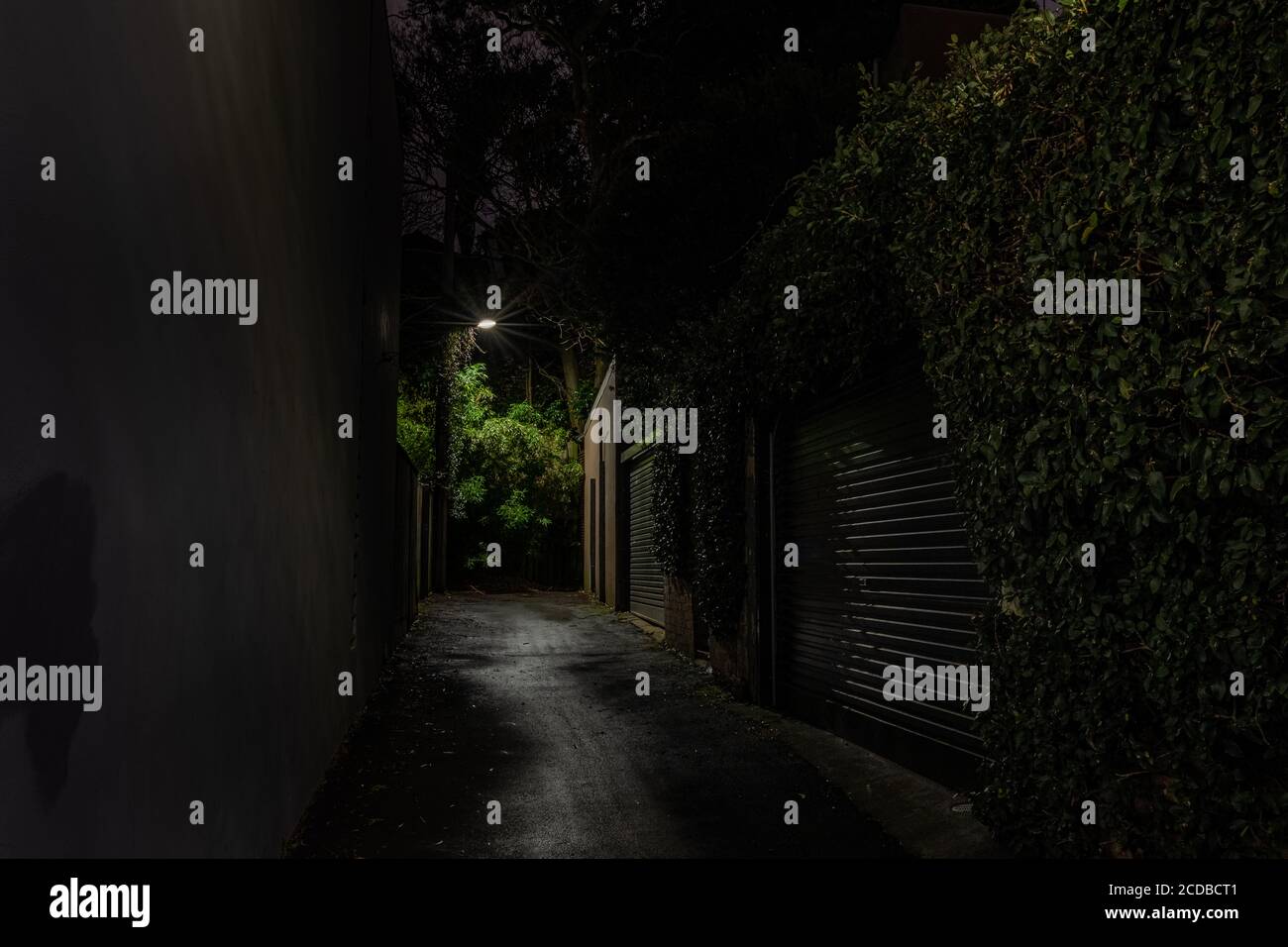 Empty backstreet at night Stock Photo - Alamy