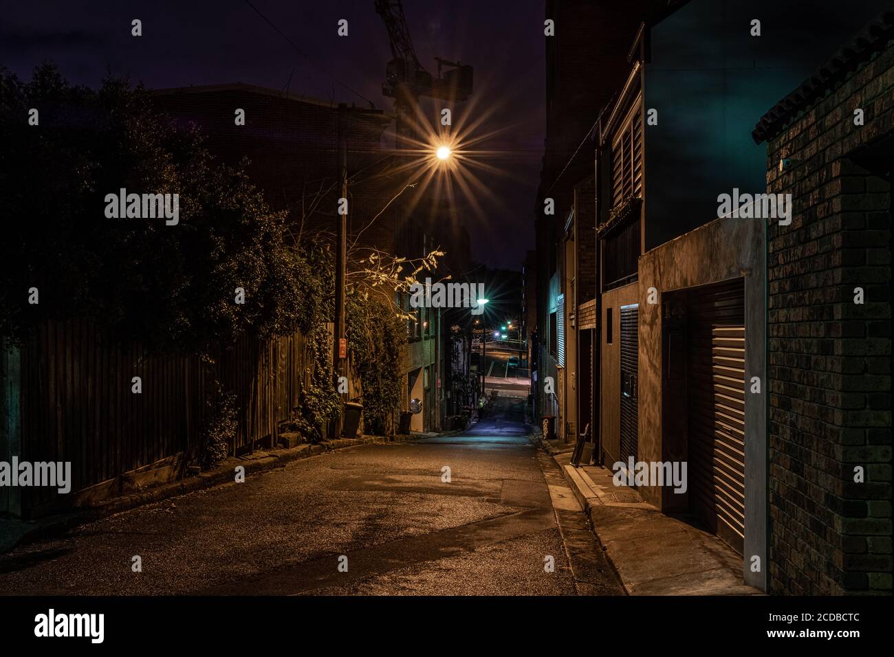 Empty backstreet at night Stock Photo - Alamy