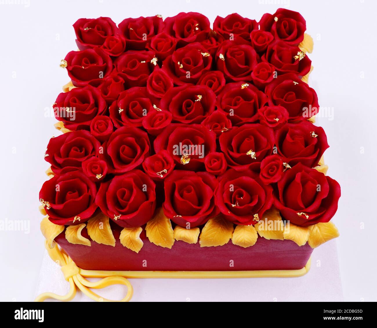 valentines day special cake with edible vibrant red roses. isolated on ...