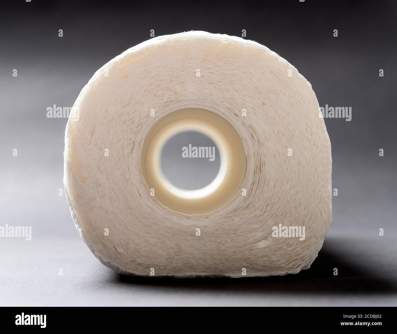 brand new paper roll for kitchen on black background Stock Photo - Alamy