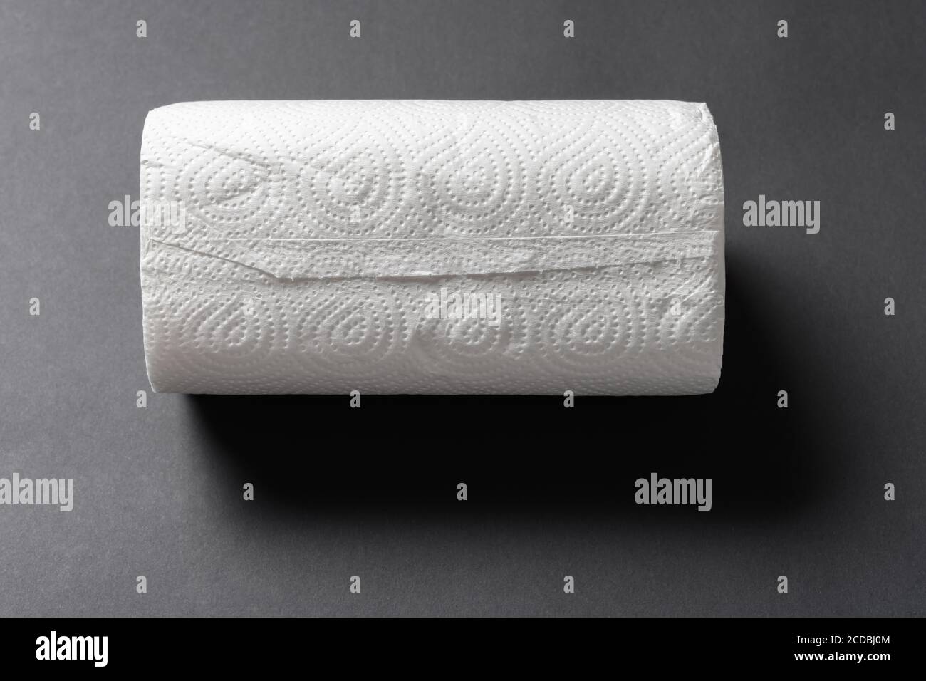 top view brand new paper roll for kitchen on black background Stock ...