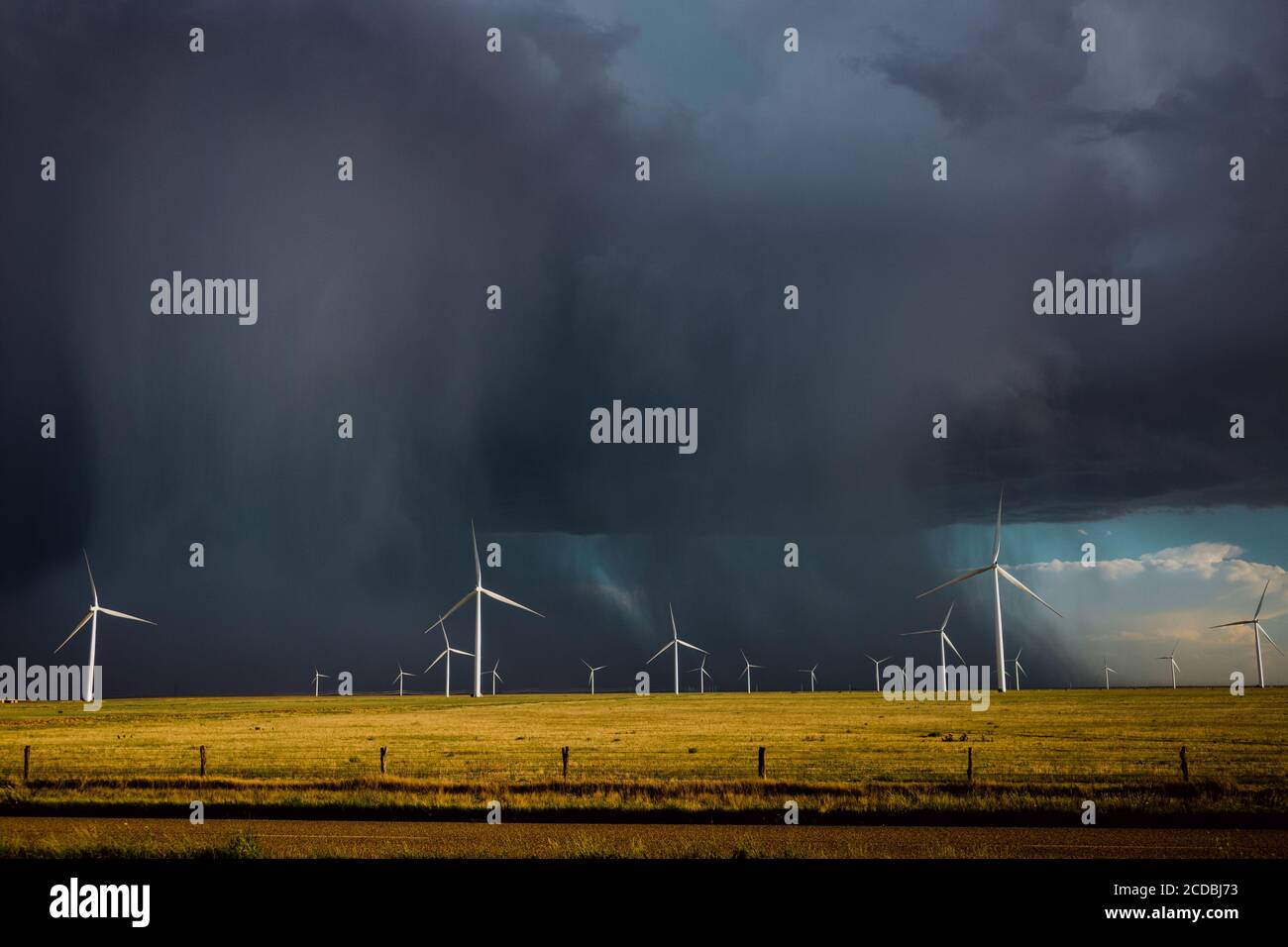 Wind farm under dramatic thunderstorm clouds Stock Photo - Alamy