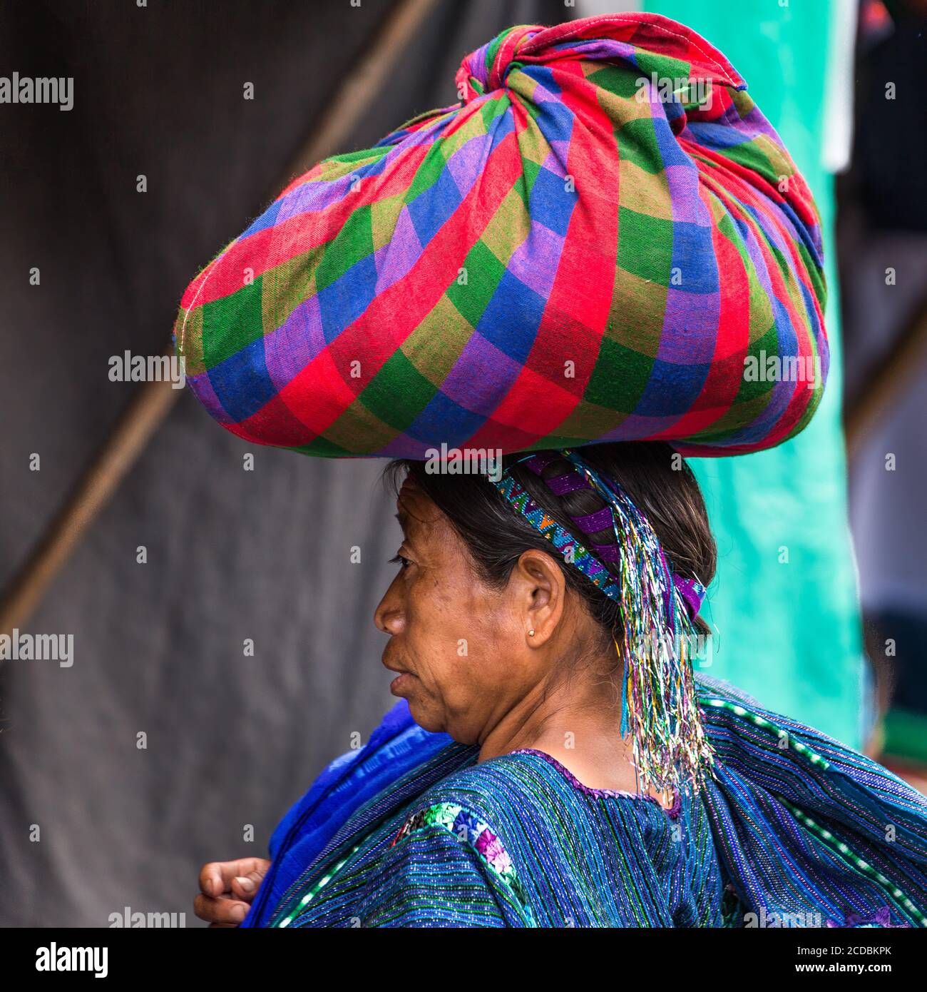 A Cakchiquel Mayan woman in traditional dress from San Antonio Palopo ...