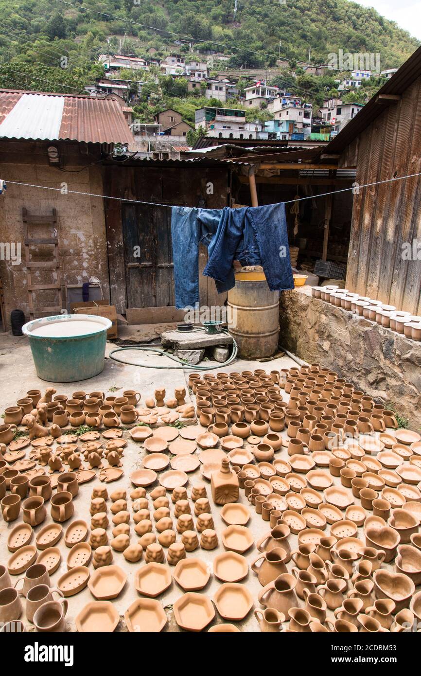 A Cakchiquel Mayan woman at her pottery workshop in the traditional ...