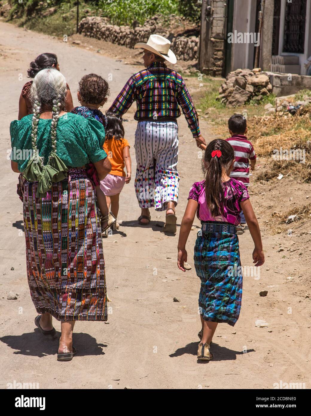 Three generations of a Tzutujil Mayan family in traditional dress ...