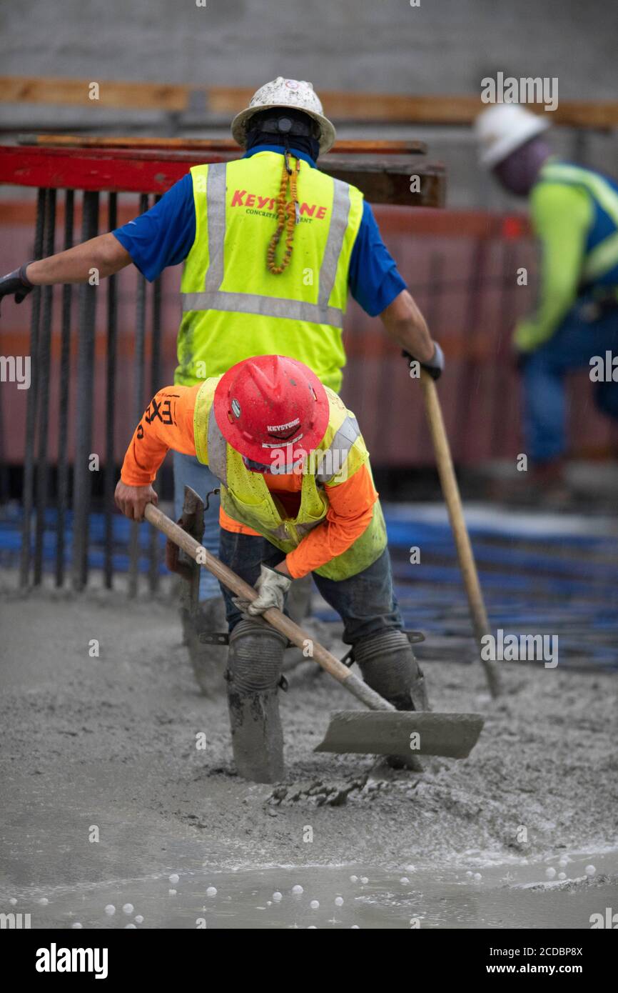 Austin, TX USA August 22, 2020: Experienced concrete crews conduct a ...