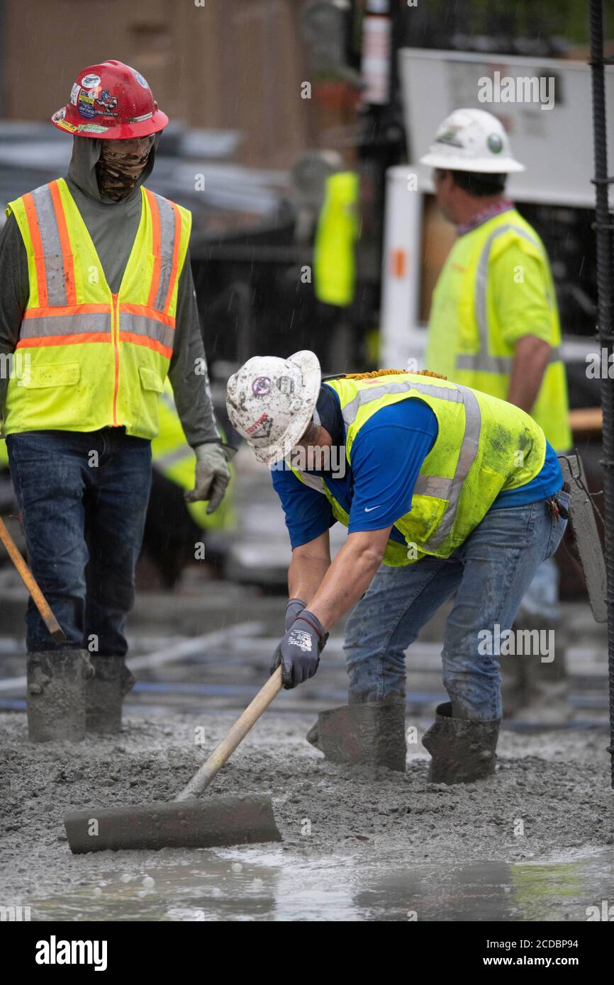 Austin, TX USA August 22, 2020: Experienced concrete crews conduct a ...