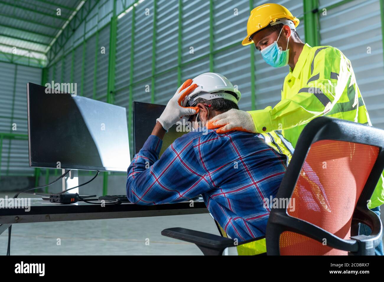 The sad feeling of engineering in the warehouse and worker Stock Photo ...