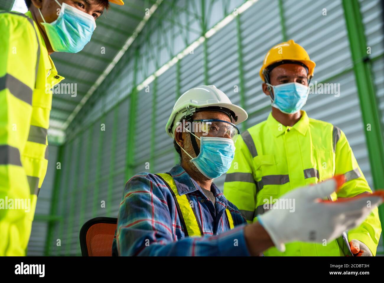 Senior engineering working training team for young engineering in the ...