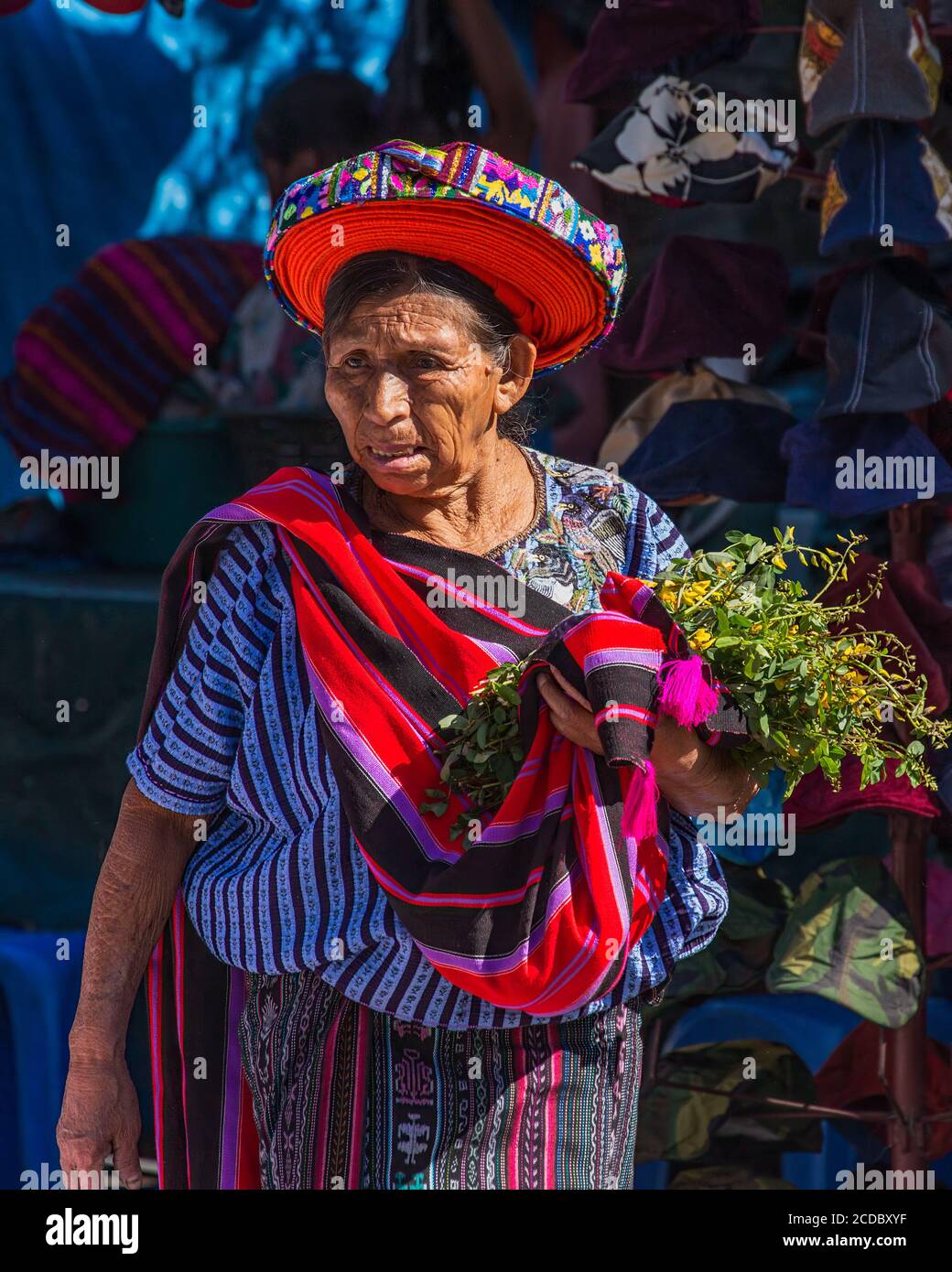 An older Tzutujil Mayan woman in traditional dress, including the ...