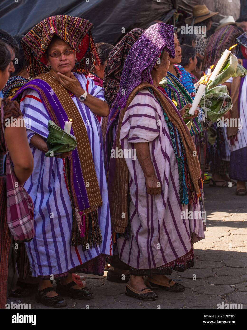 Tzutujil Mayan women in traditional dress, some in special long huipils ...