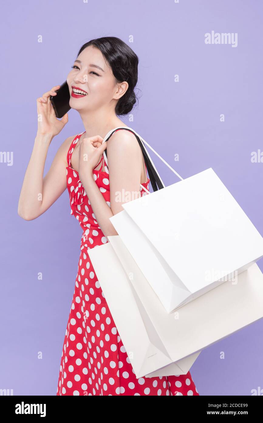 Life style concept, happy shopping time. Young asian woman with ...