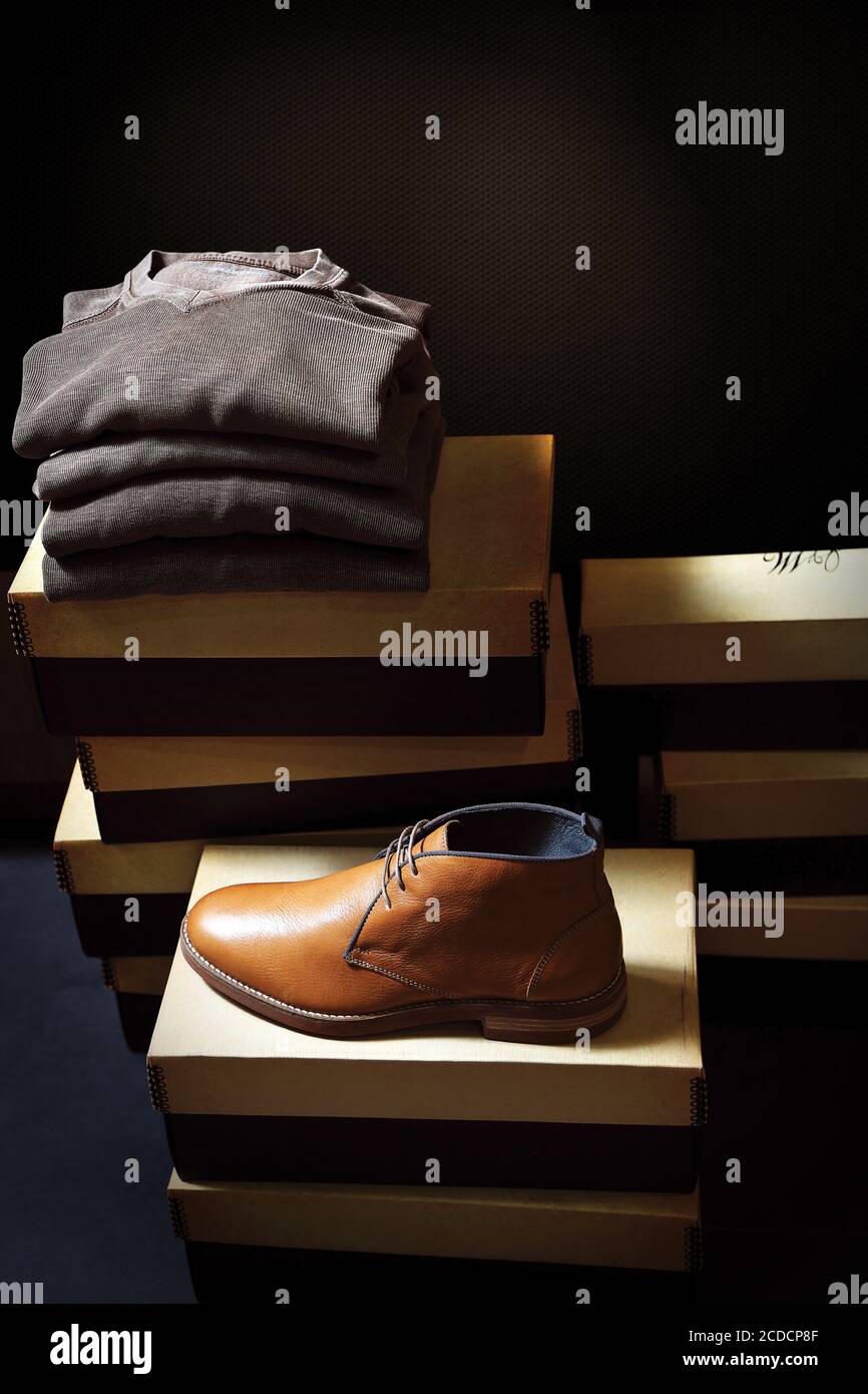 Leather shoe and sweater on the boxes hi-res stock photography and ...