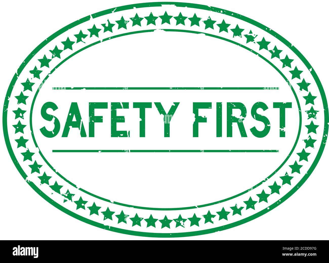 Grunge green safety first word oval rubber seal stamp on white ...