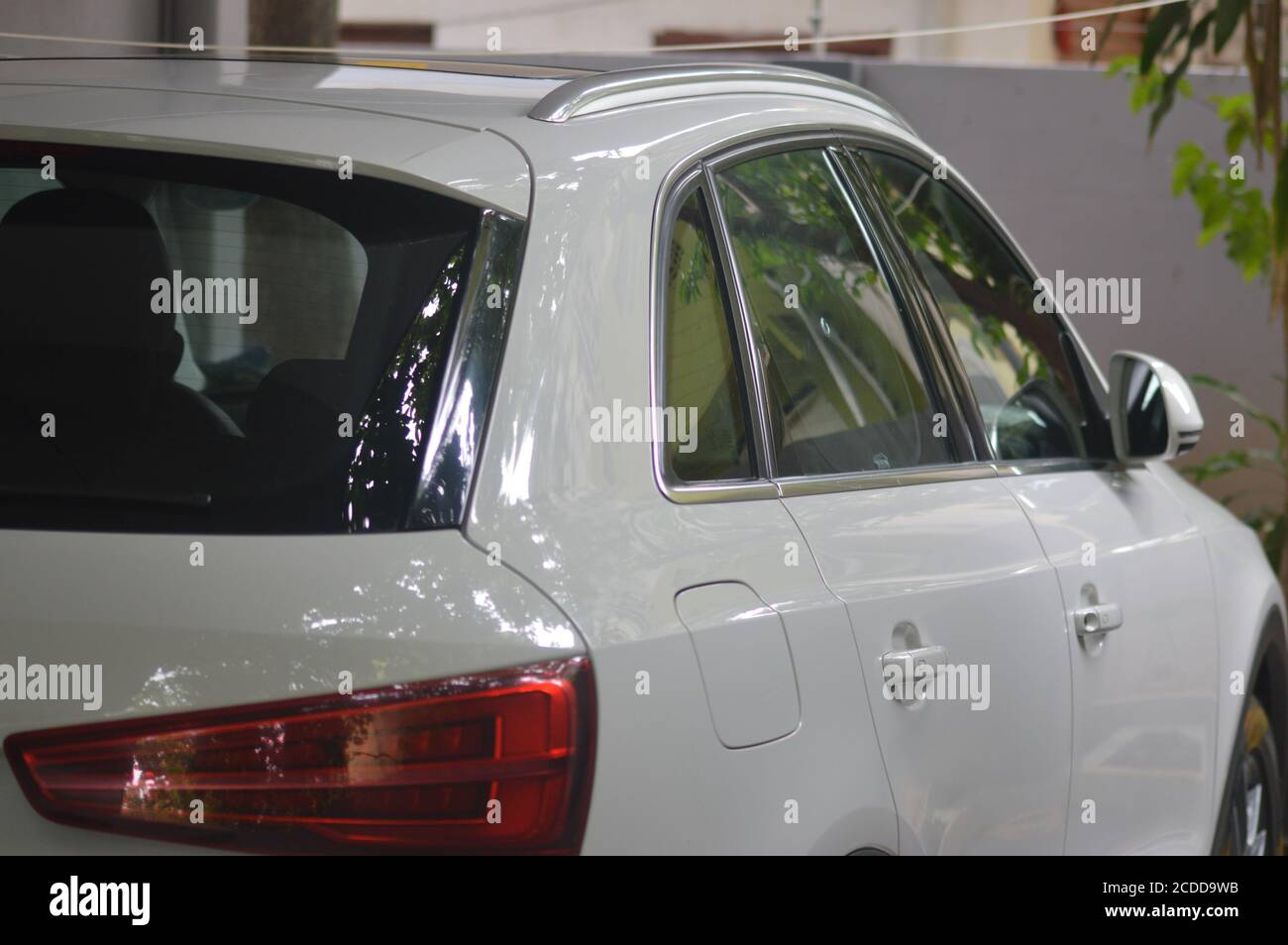 Luxury cars parked in a modern house in India Stock Photo - Alamy
