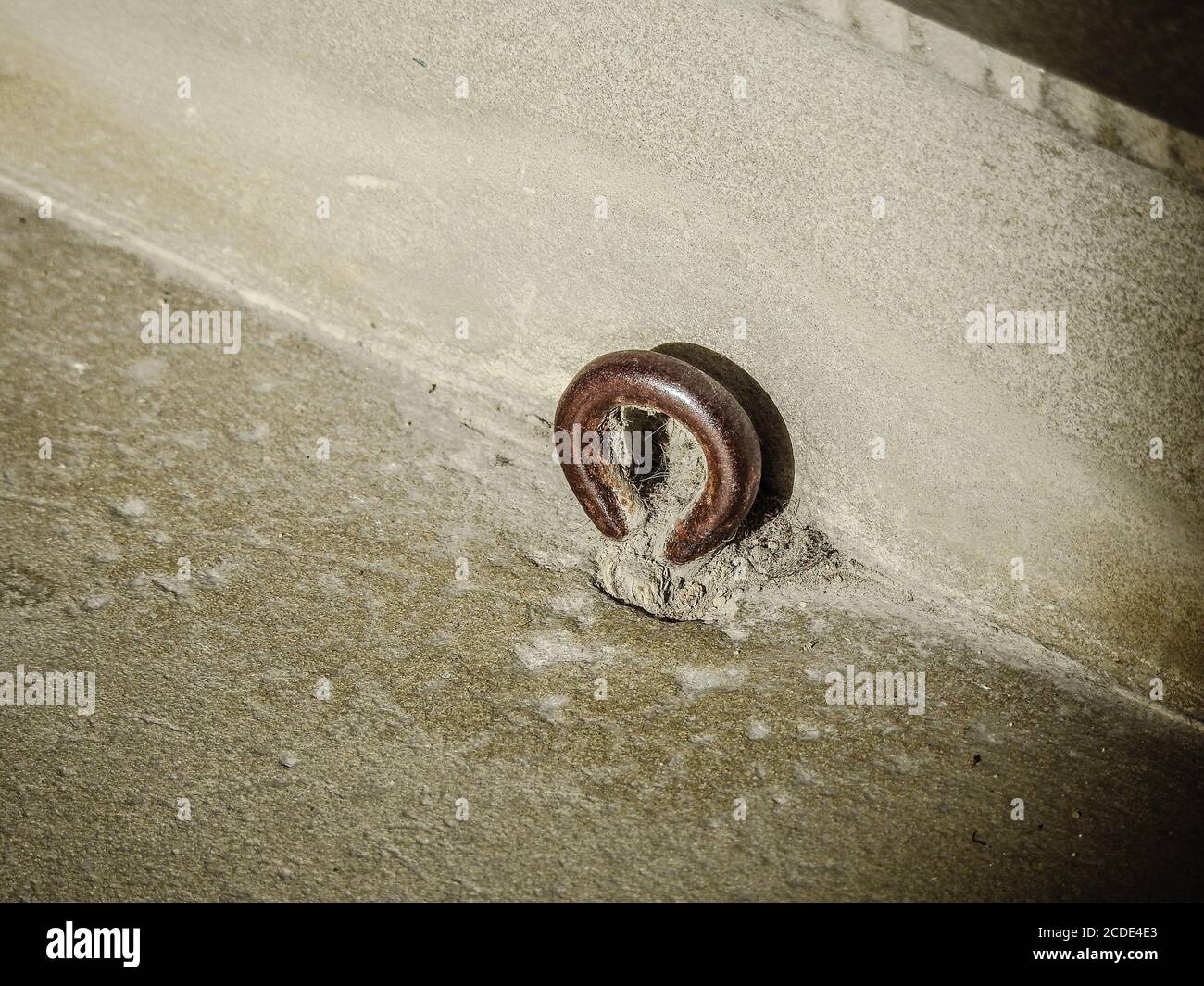 Metal lug in front of a stone stair Stock Photo - Alamy