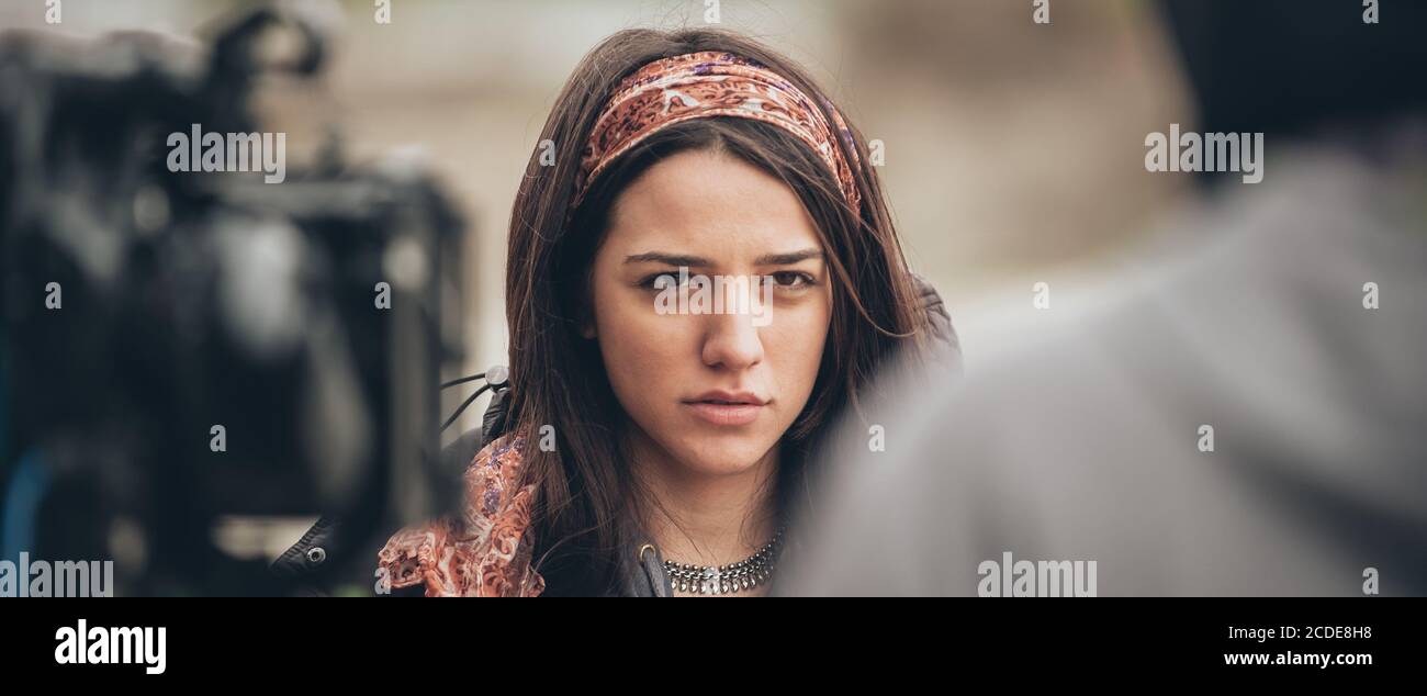 Behind the scene. Actress in front of the camera on the film set ...