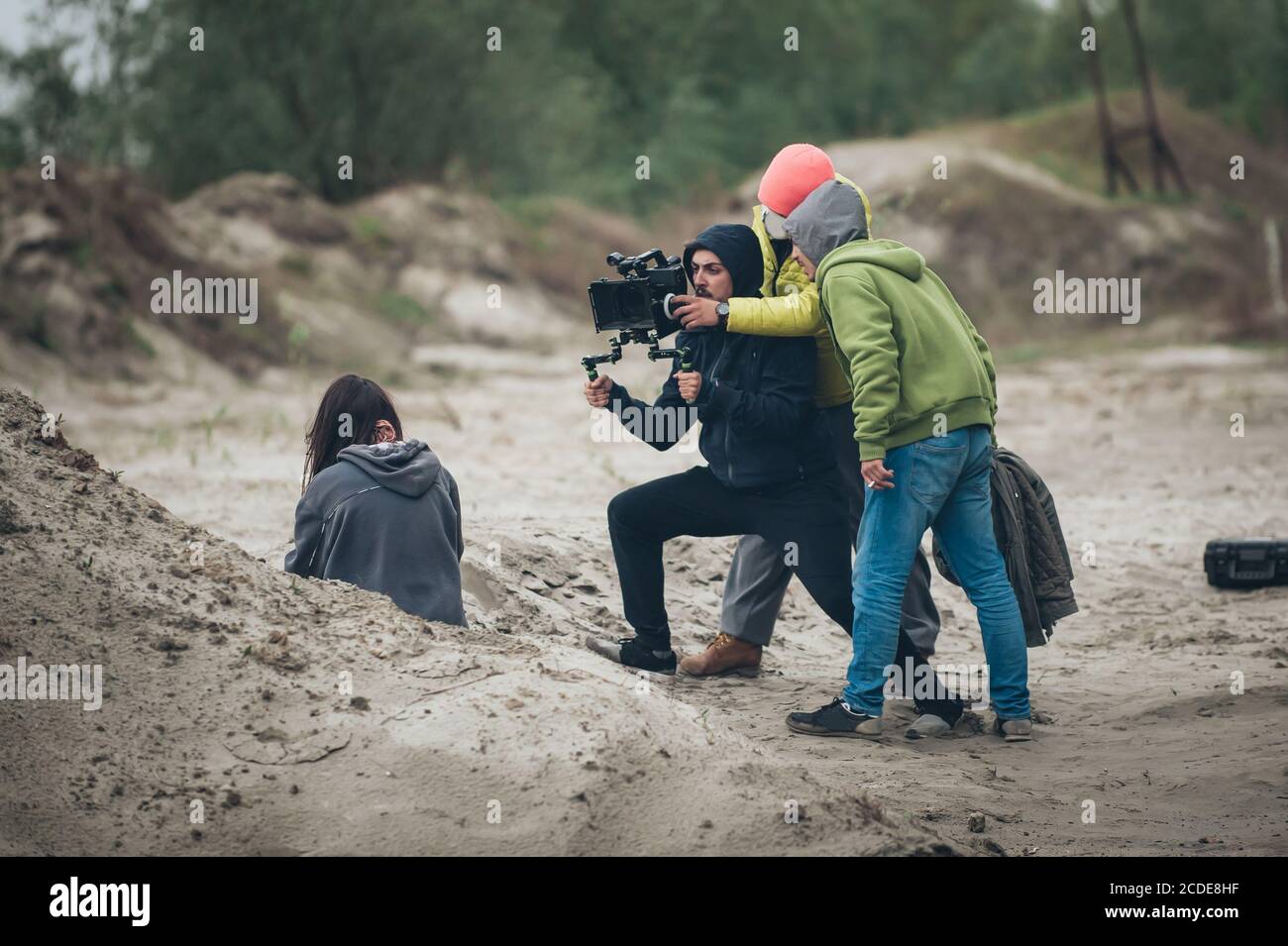 Behind the scene. Actress in front of the camera on the film set ...
