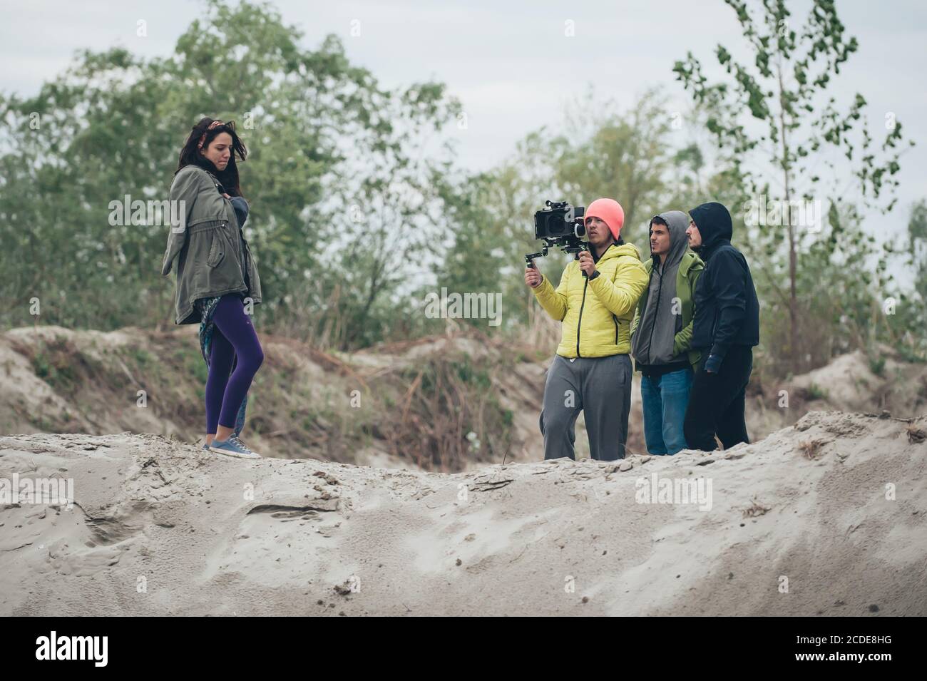 Behind the scene. Actress in front of the camera on the film set ...