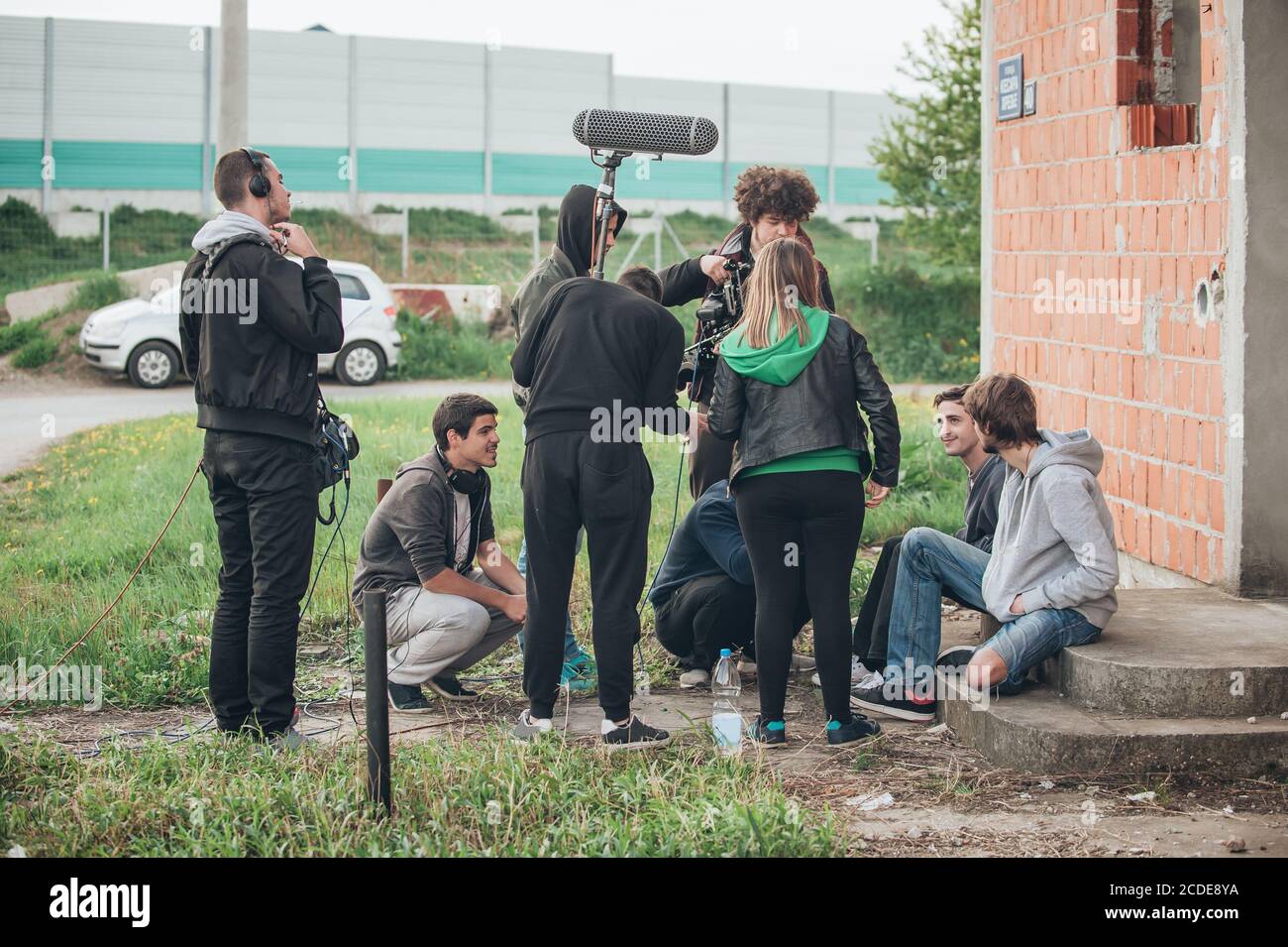 Behind the scene. Film crew team filming movie scene on outdoor ...