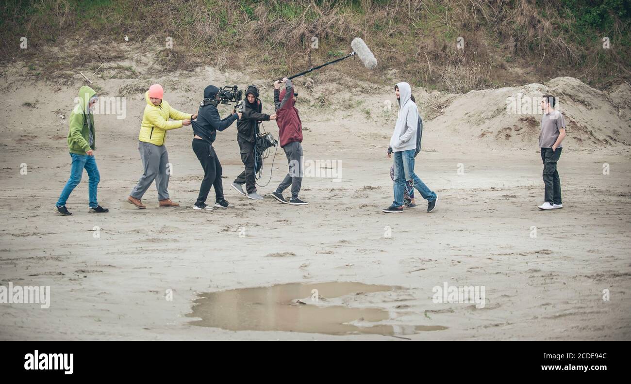 Behind the scene. Film crew team filming movie scene on outdoor ...