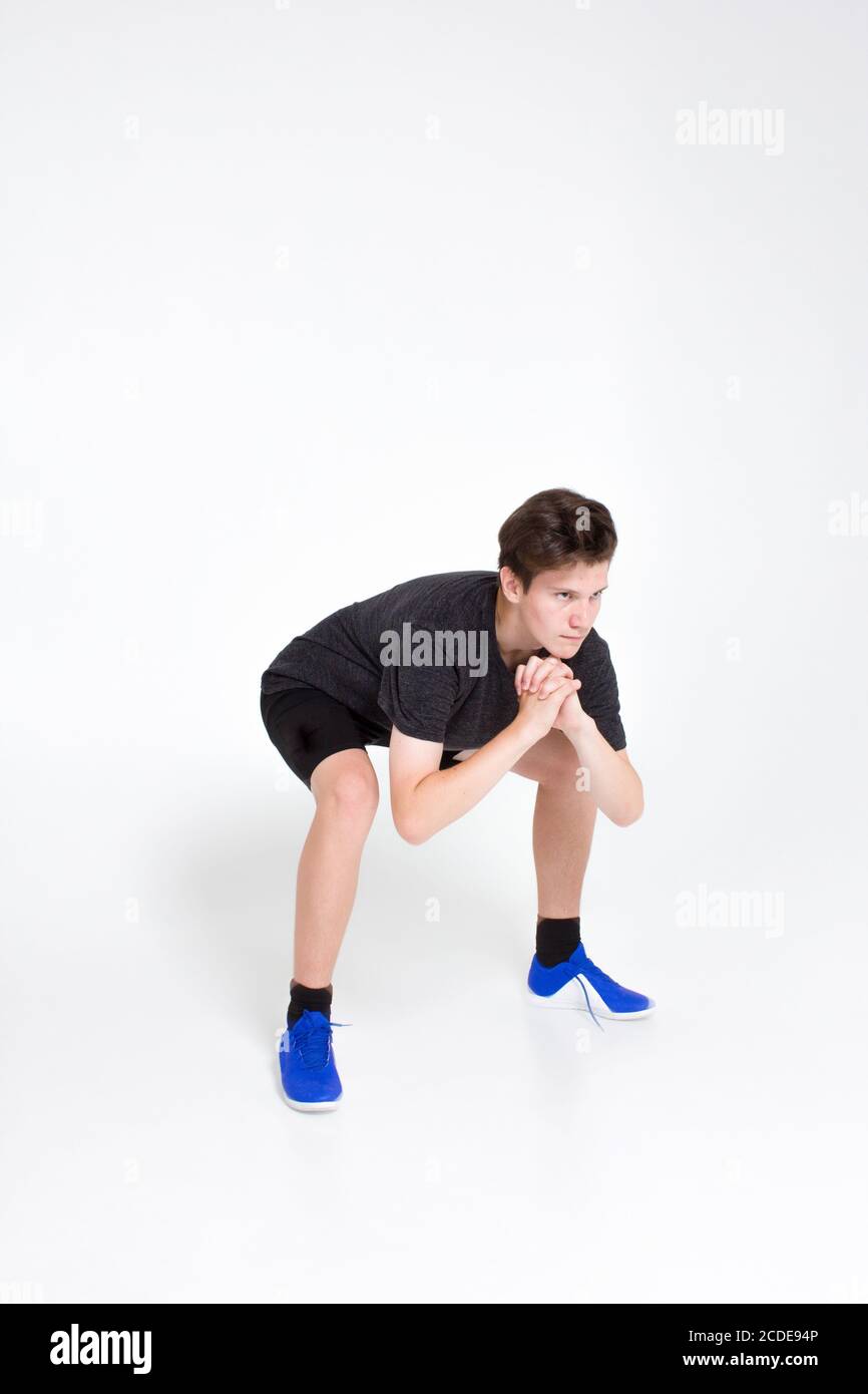 Boy crouches hi-res stock photography and images - Alamy