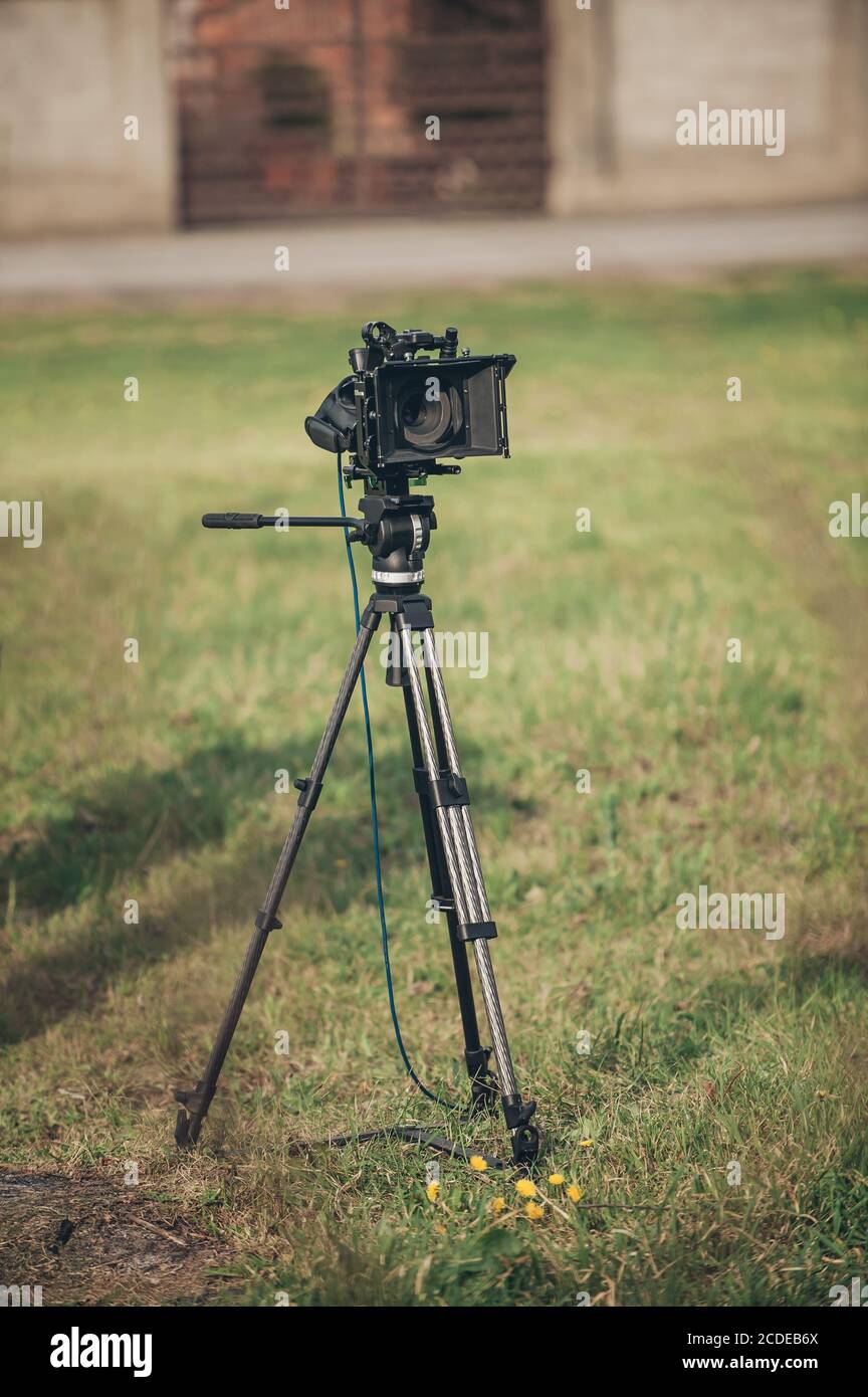 Behind the scene. Film camera on outdoor location Stock Photo - Alamy