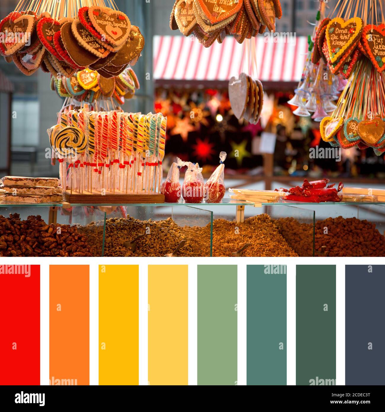 German Christmas street market in Berlin, with sweet festive treats of ...