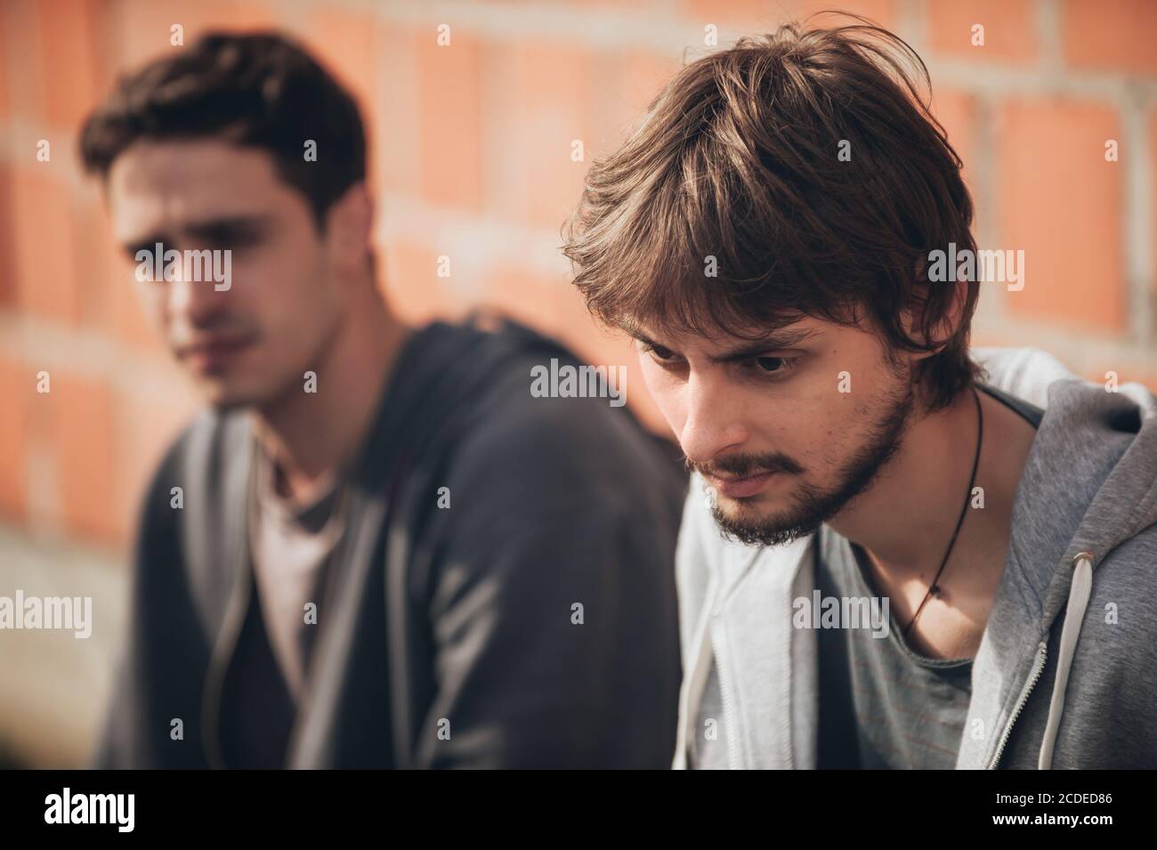 Two friends talking serious hi-res stock photography and images - Alamy