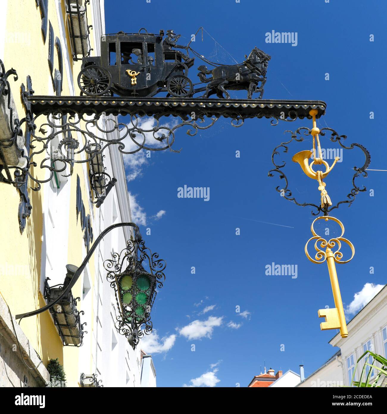 Post cage, post horn and key, symbols of former times Stock Photo - Alamy