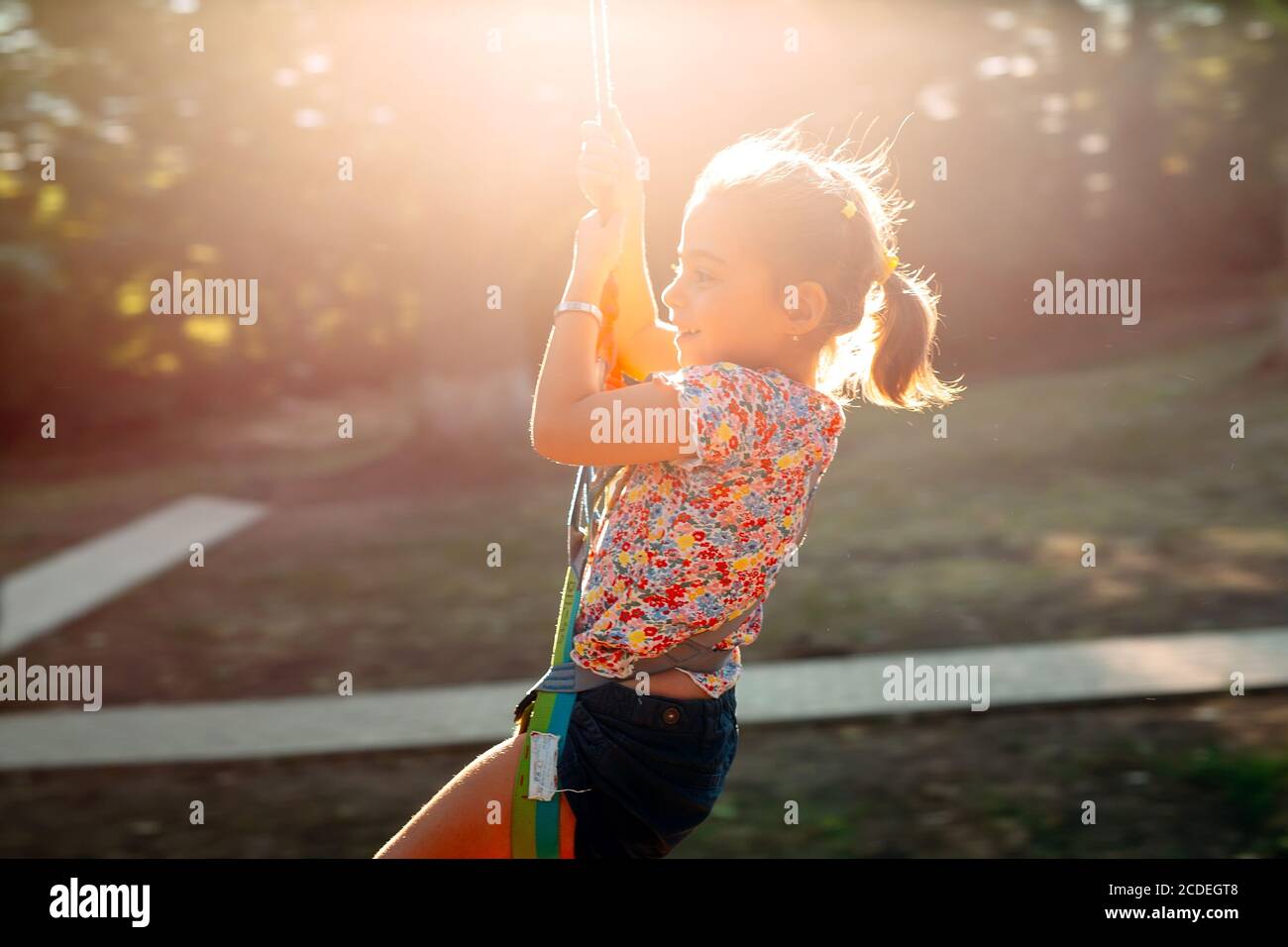 Children Jumping In Air In Park High Resolution Stock Photography and ...