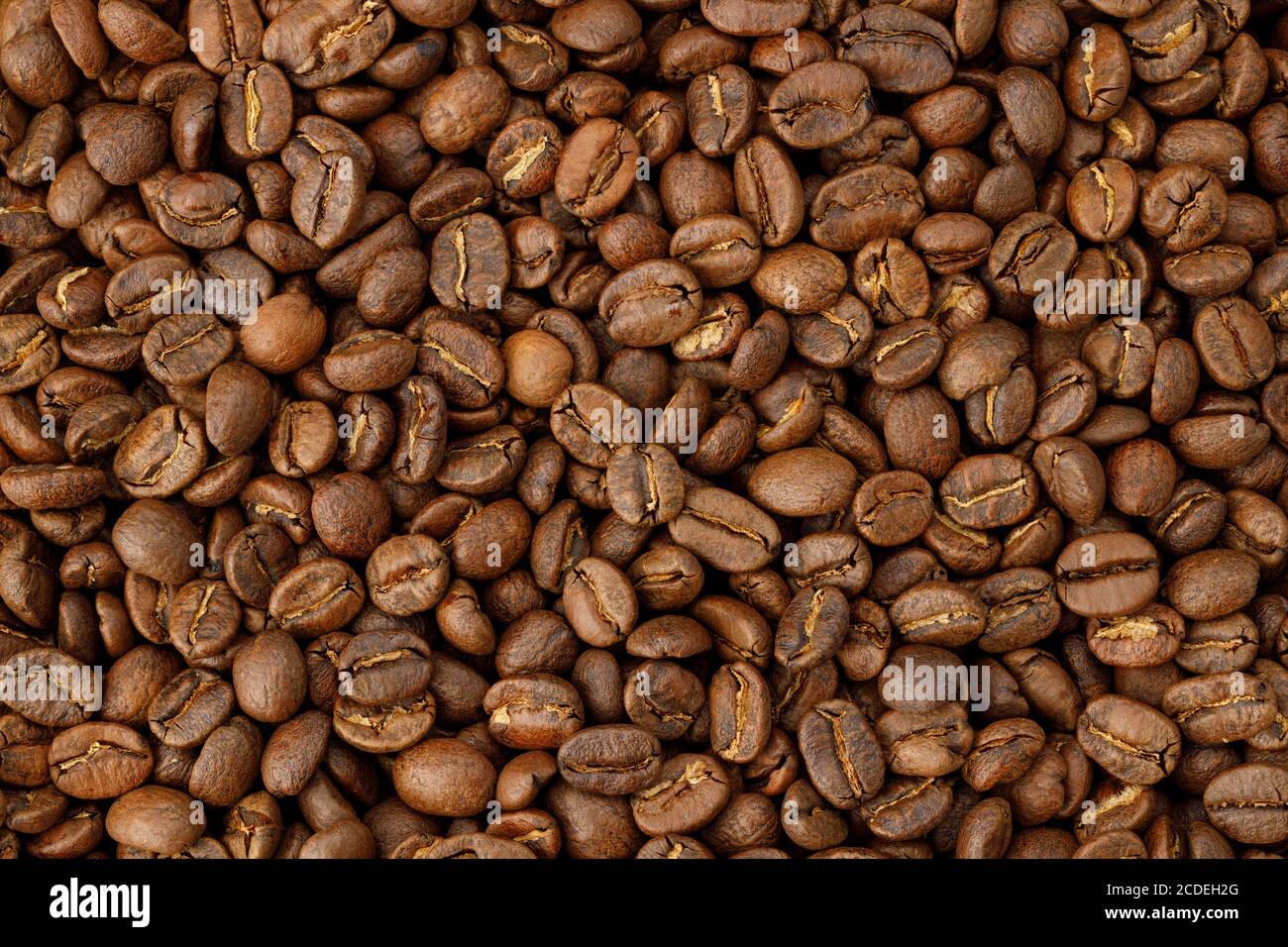 Aromatic roasted coffee beans background. Texture top view Stock Photo ...
