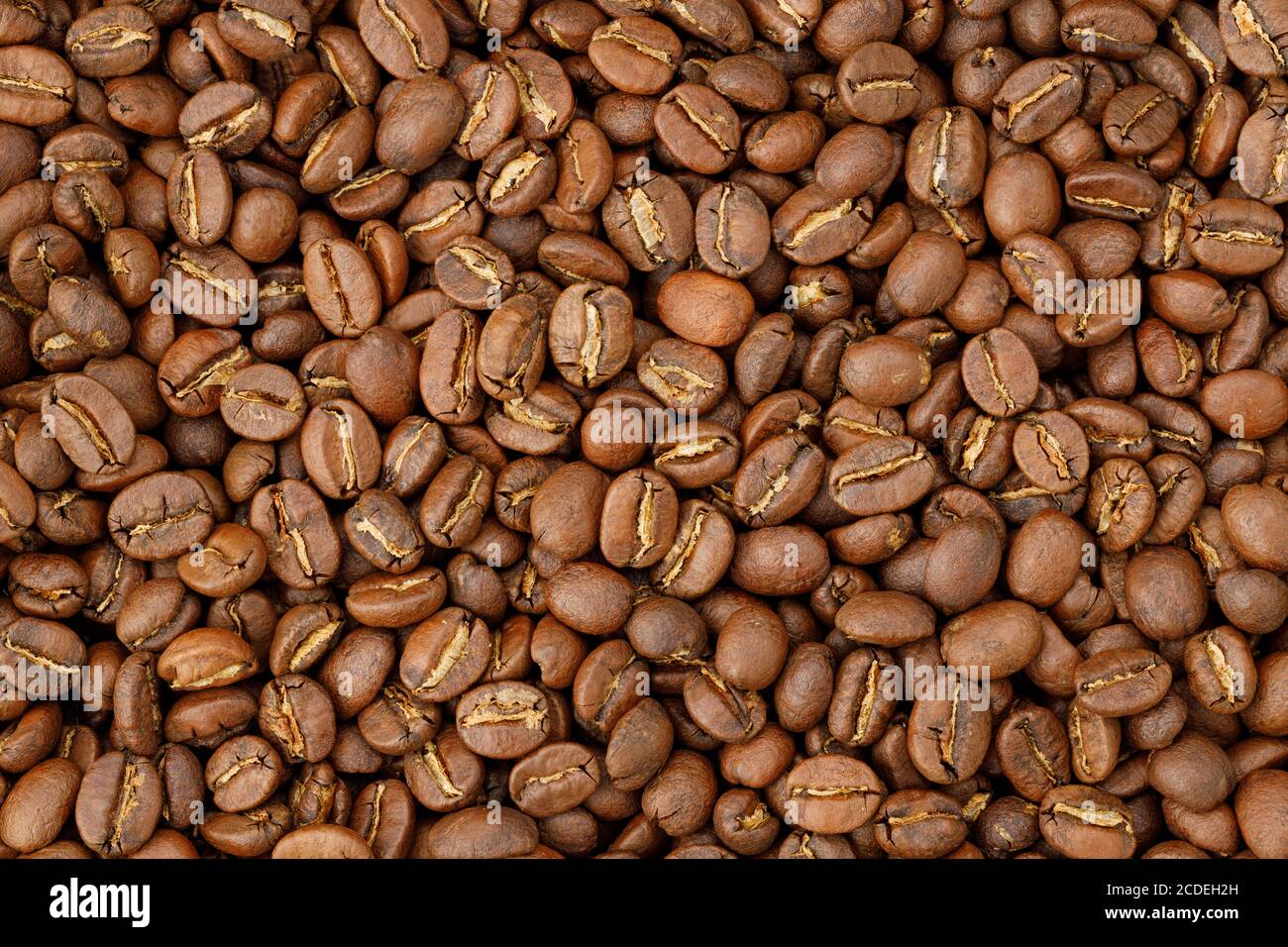 Aromatic roasted coffee beans background. Texture top view Stock Photo ...