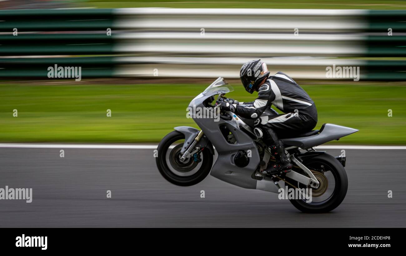 On one wheel hi-res stock photography and images - Alamy