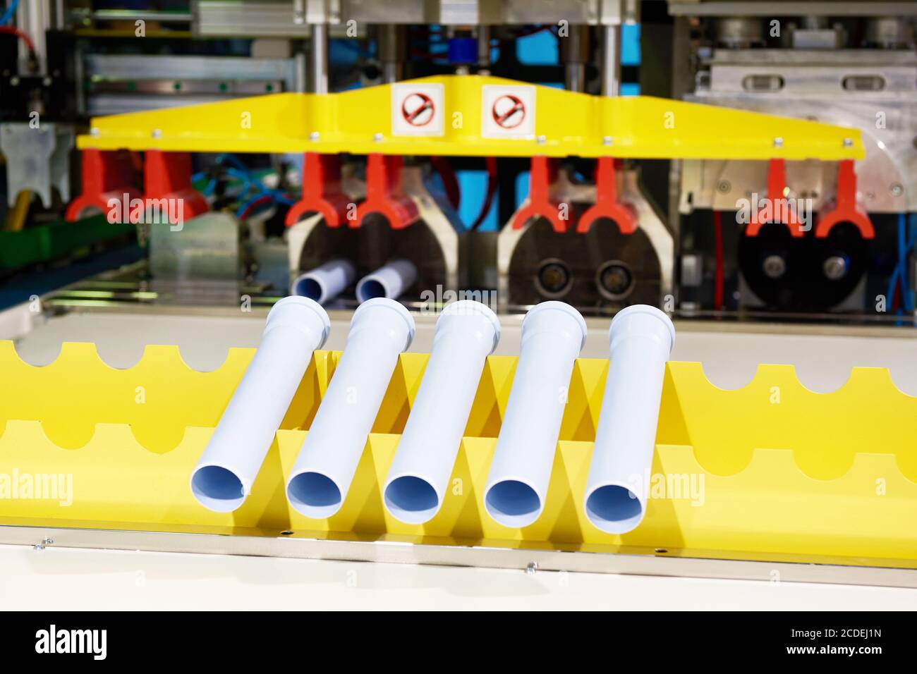 Modern plastic pipe machine at the factory Stock Photo - Alamy
