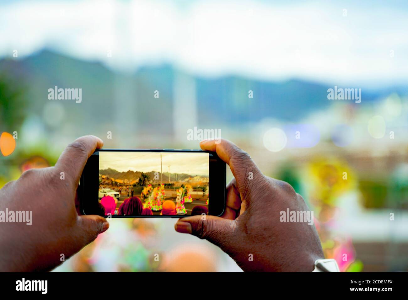 Carnival history.Man recording show with mobile - using technology for ...