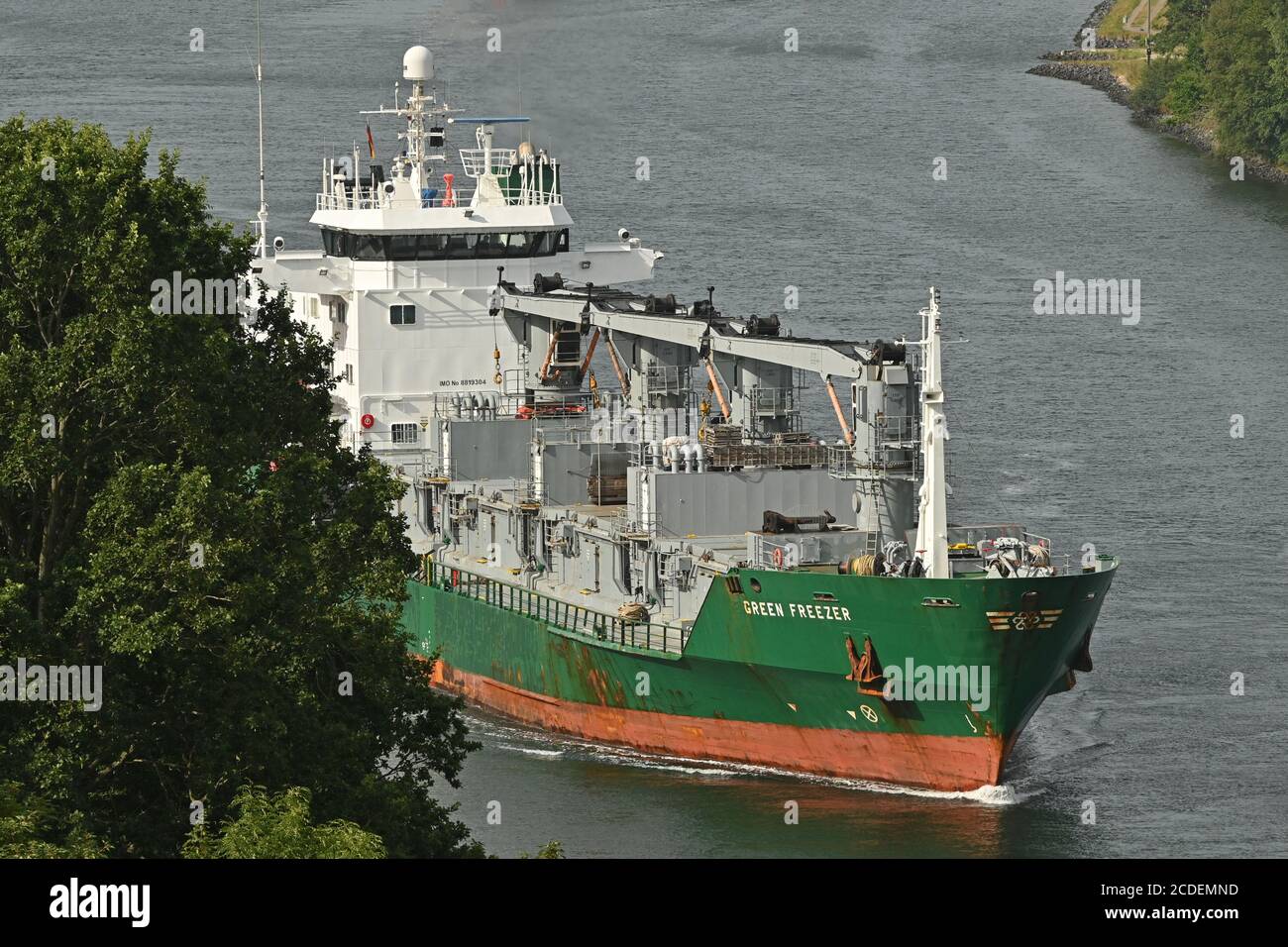 Reefer Green Freezer passing the Kiel Canal Stock Photo - Alamy