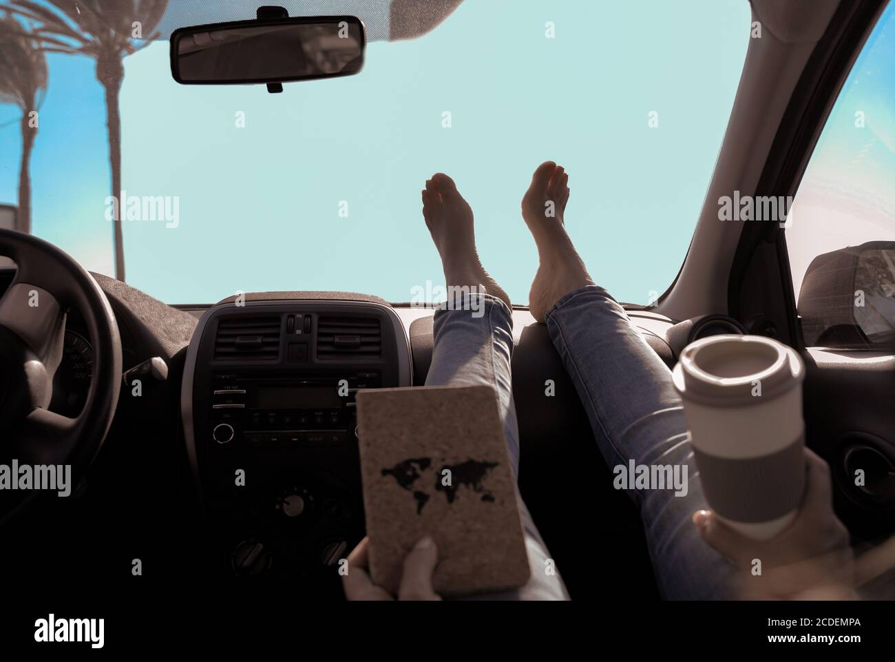Feet on dashboard car on hi-res stock photography and images - Alamy