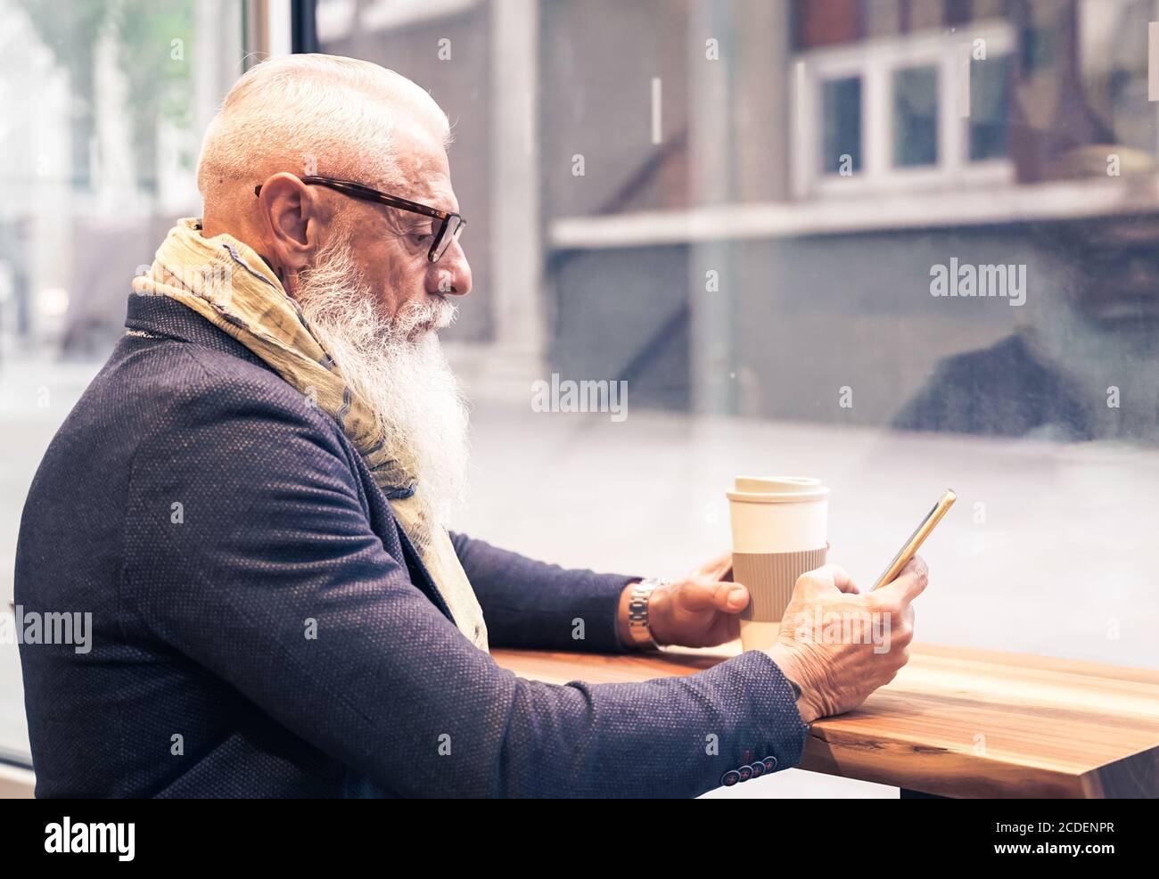 Elderly male in trendy hi-res stock photography and images - Alamy