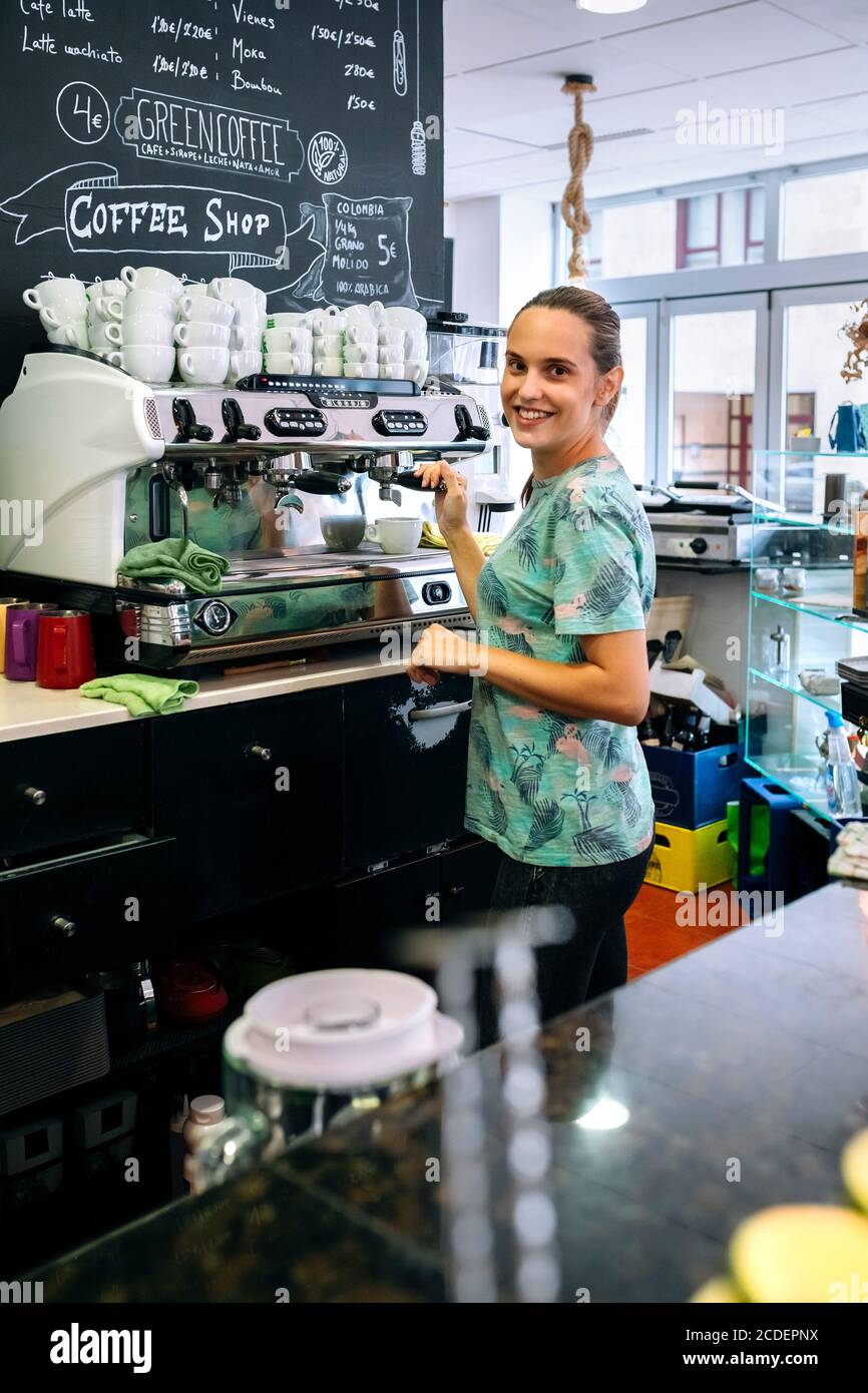 Female coffee maker hi-res stock photography and images - Alamy