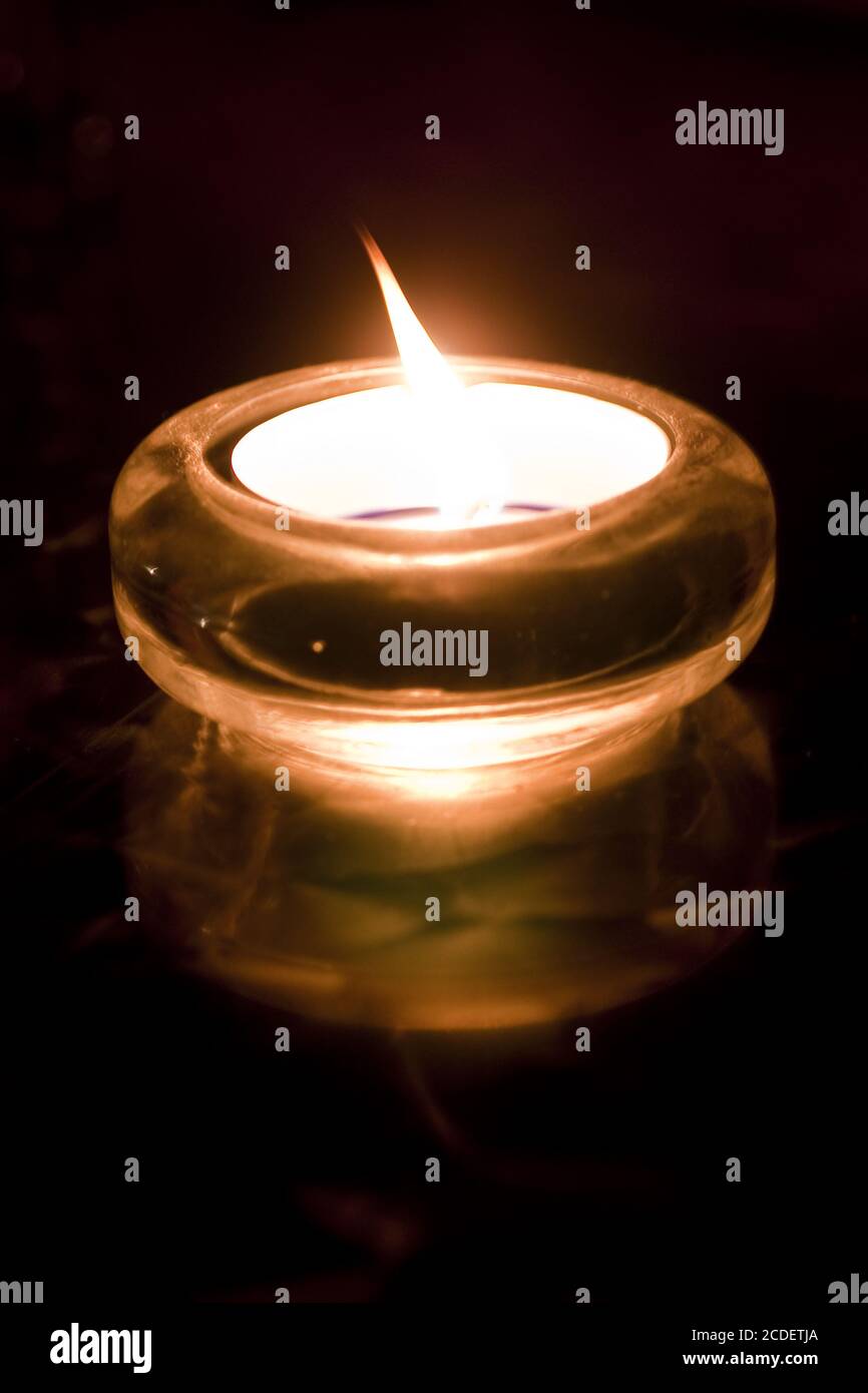 A candle one candle Stock Photo - Alamy