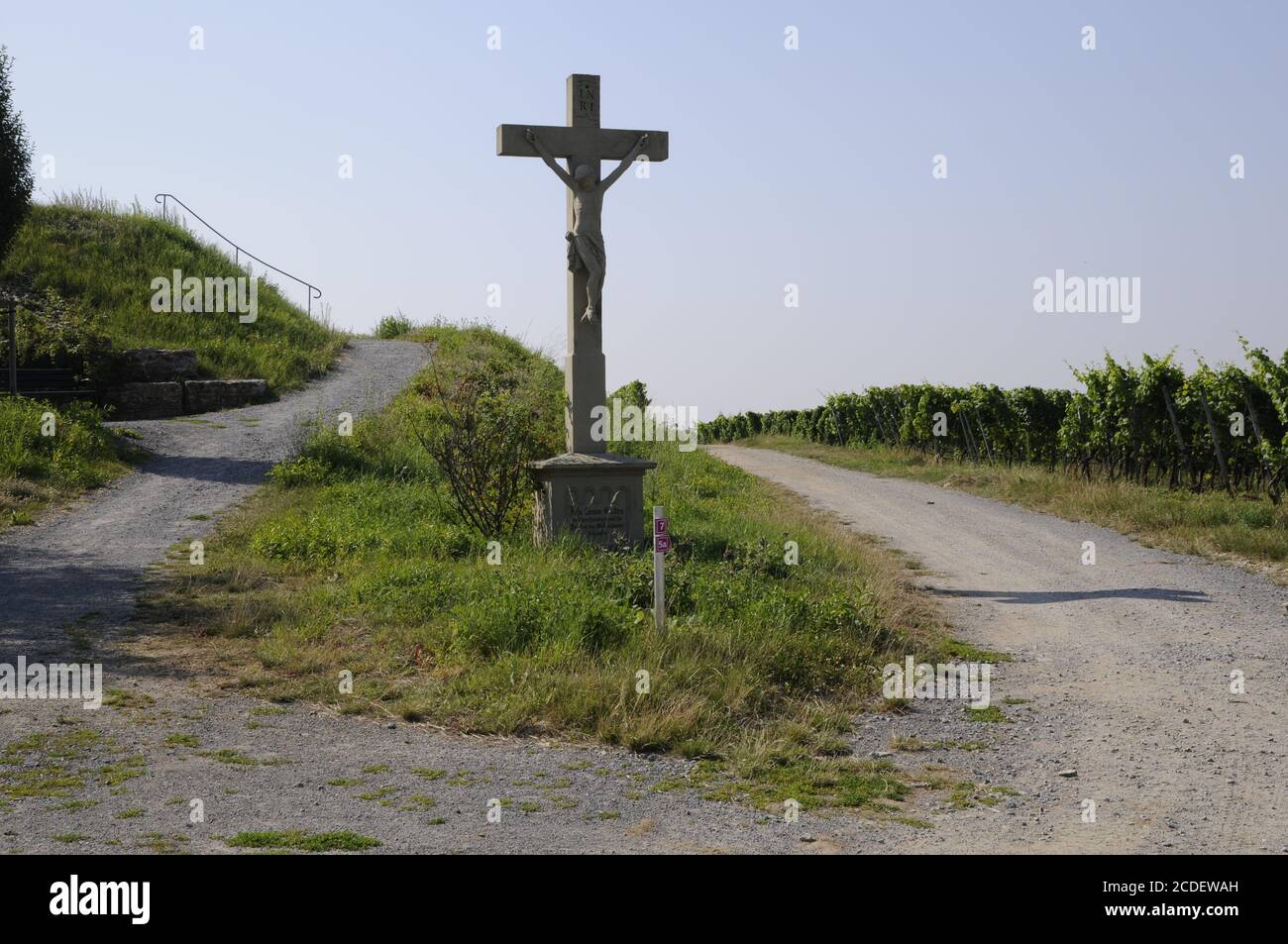 Cross between paths Stock Photo - Alamy
