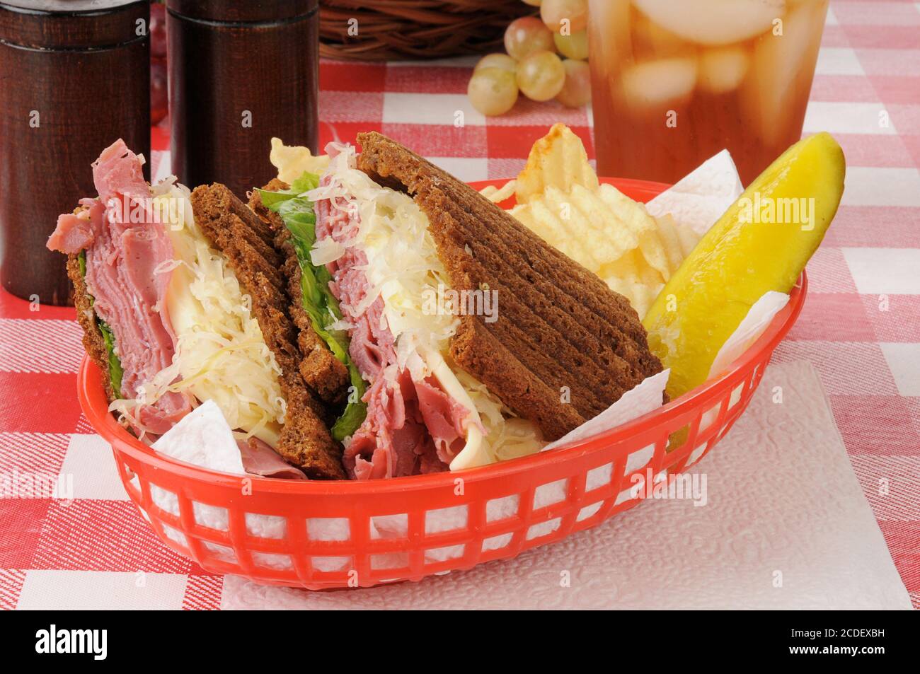 A reuben sandwich with potato chips Stock Photo - Alamy