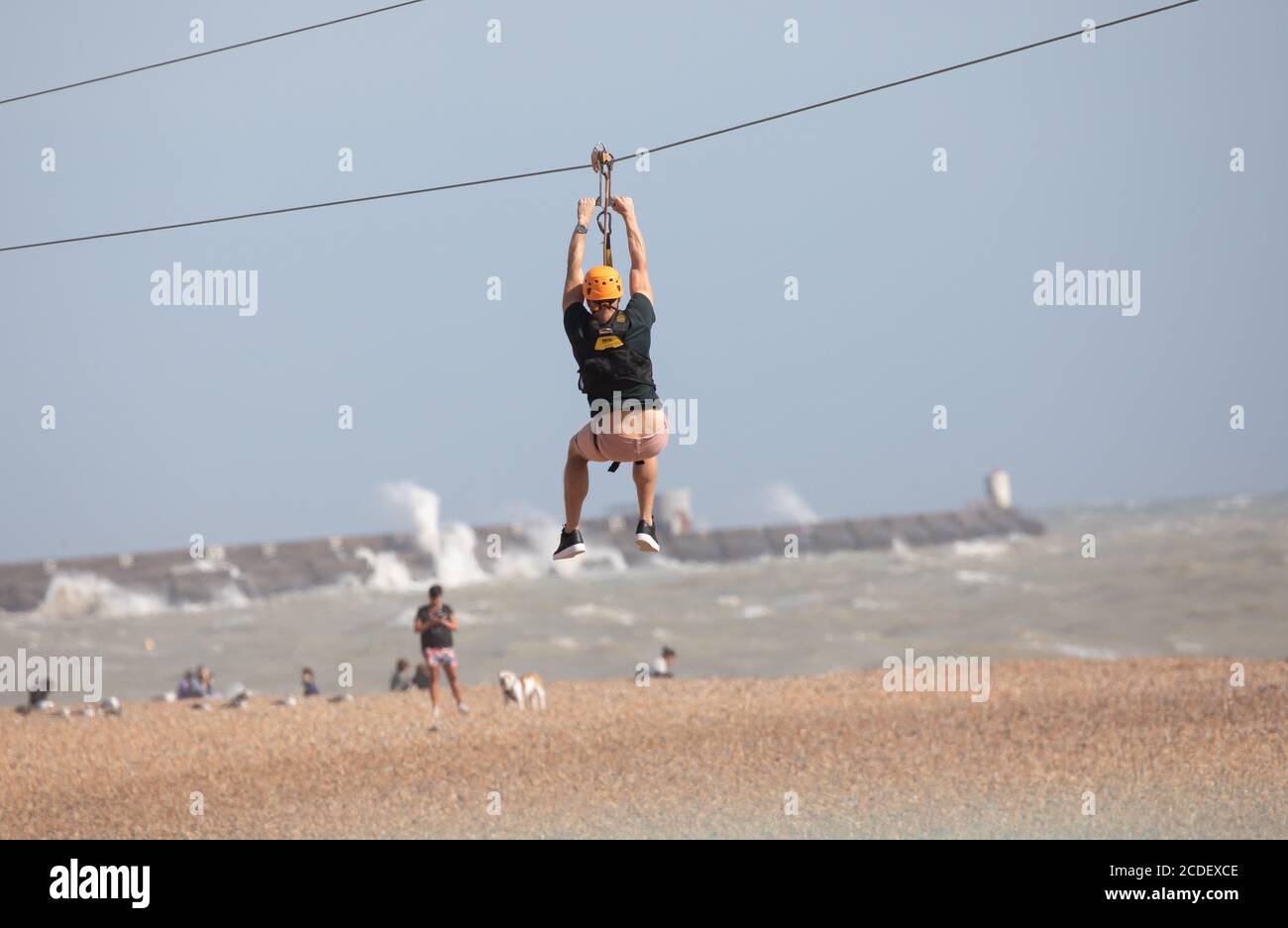 People ride The Zip Wire in Brighton, East Sussex, UK Stock Photo - Alamy