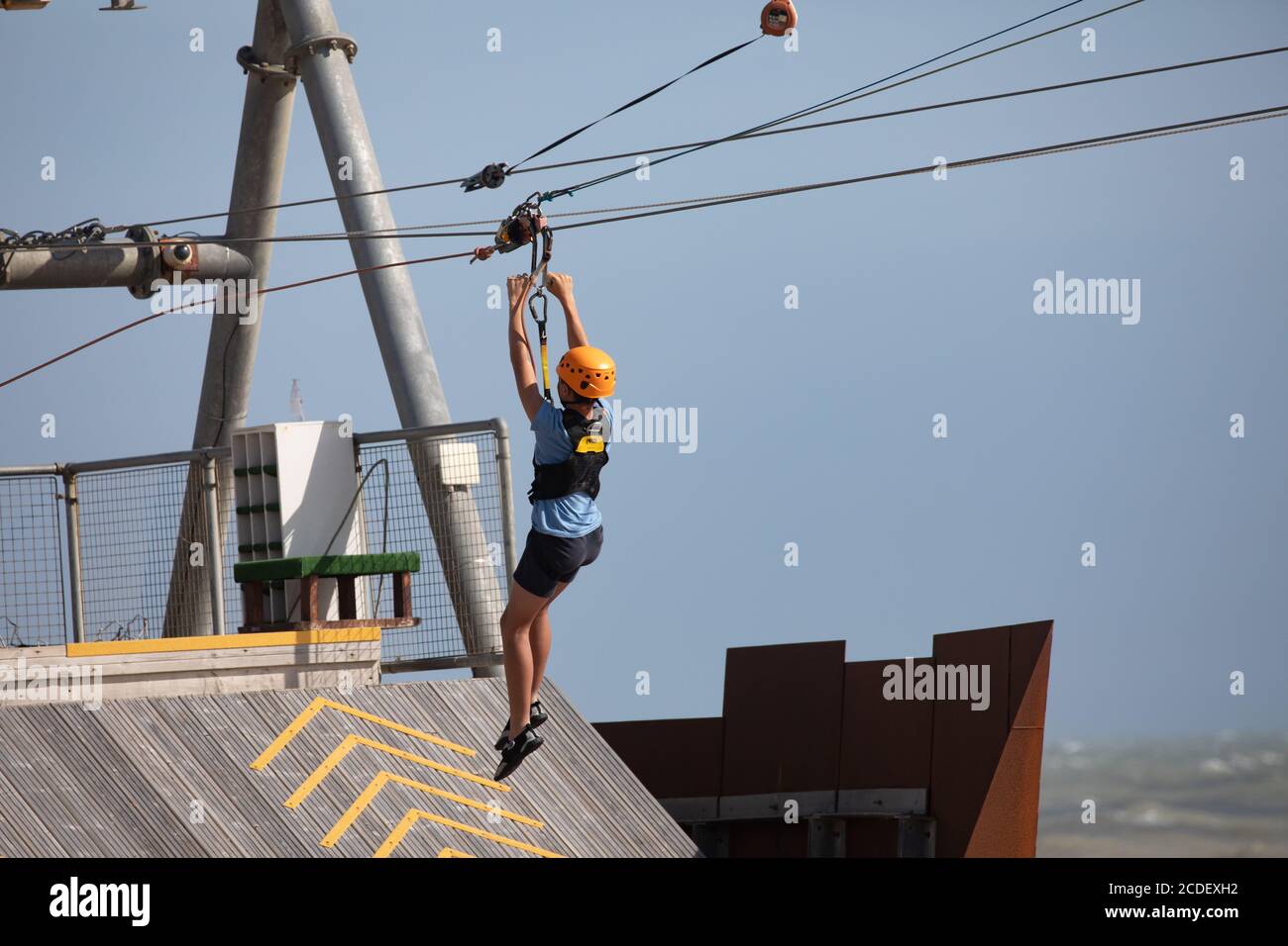 People ride The Zip Wire in Brighton, East Sussex, UK Stock Photo - Alamy
