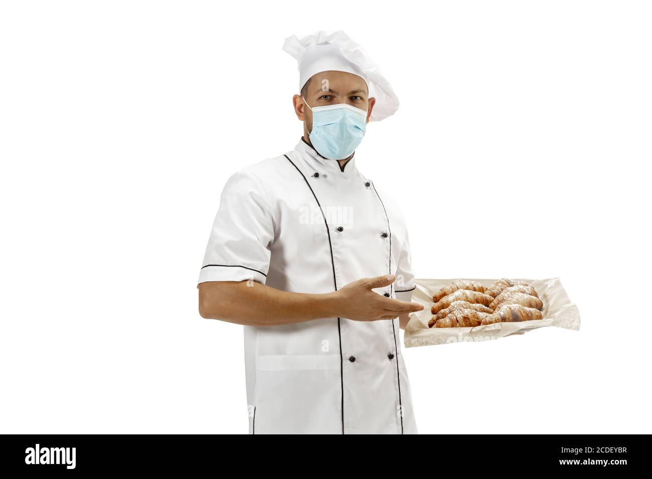 Cooker, chef, baker in face mask in uniform on white background with ...
