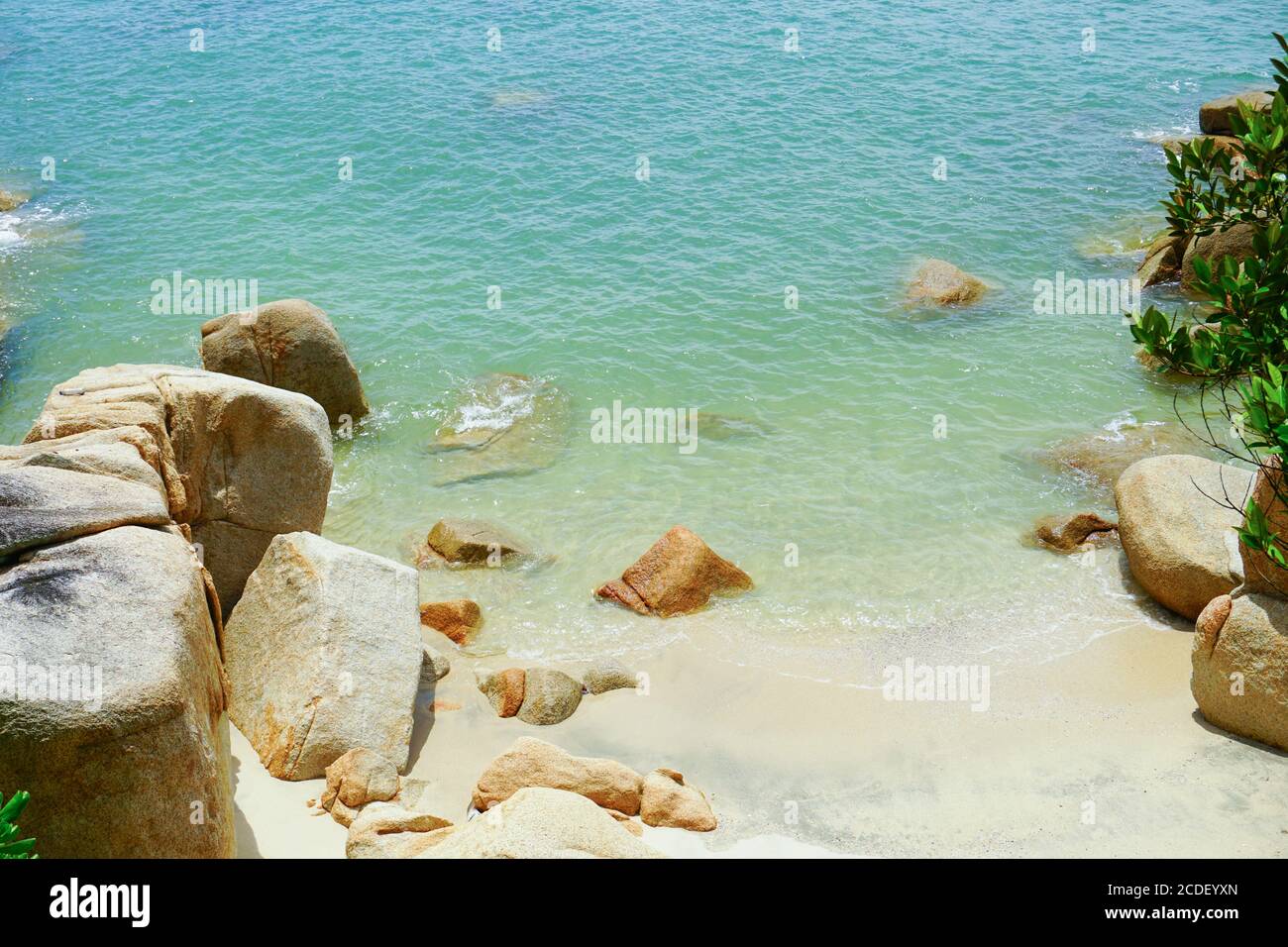 Tropical beach and blue sky background ona Rocky beach landscape on ...