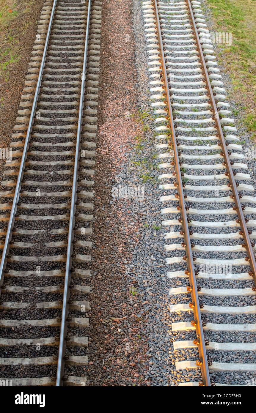 Transport security concept. Two parallel railways Stock Photo - Alamy